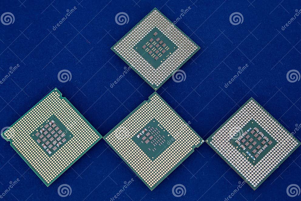 Four Computer Chip on the Blue Background. Stock Image - Image of green ...