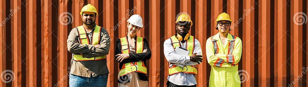 Four Construction Workers Stand Confidently in Front of a Container ...