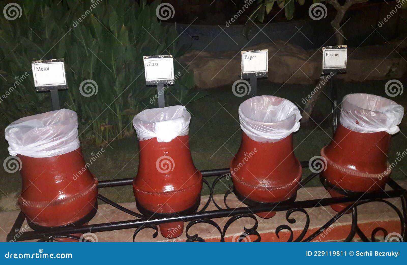 Four Containers for Collecting and Sorting Different Types of Waste for ...