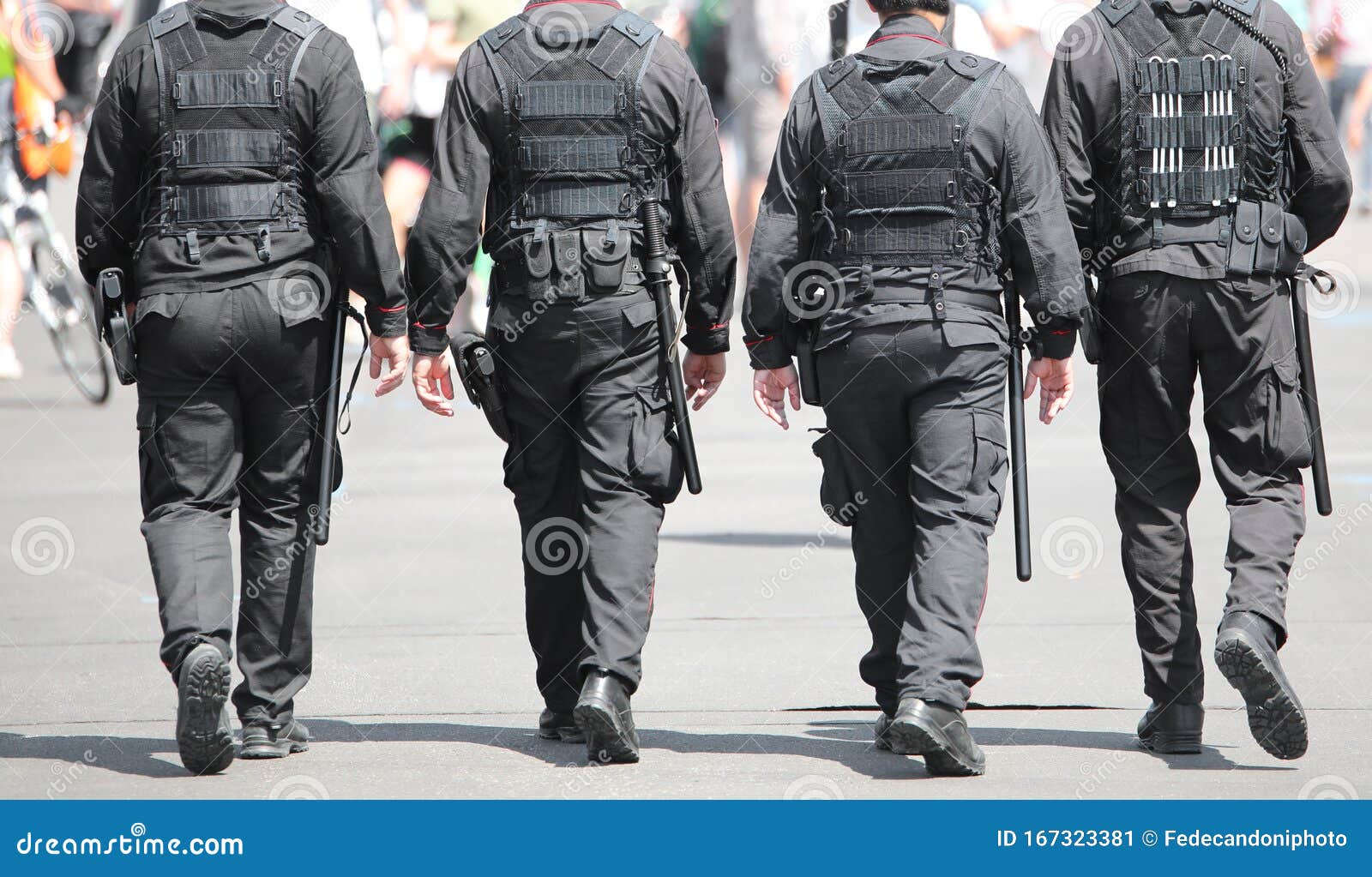 Four cops with uniform stock image. Image of counter - 167323381