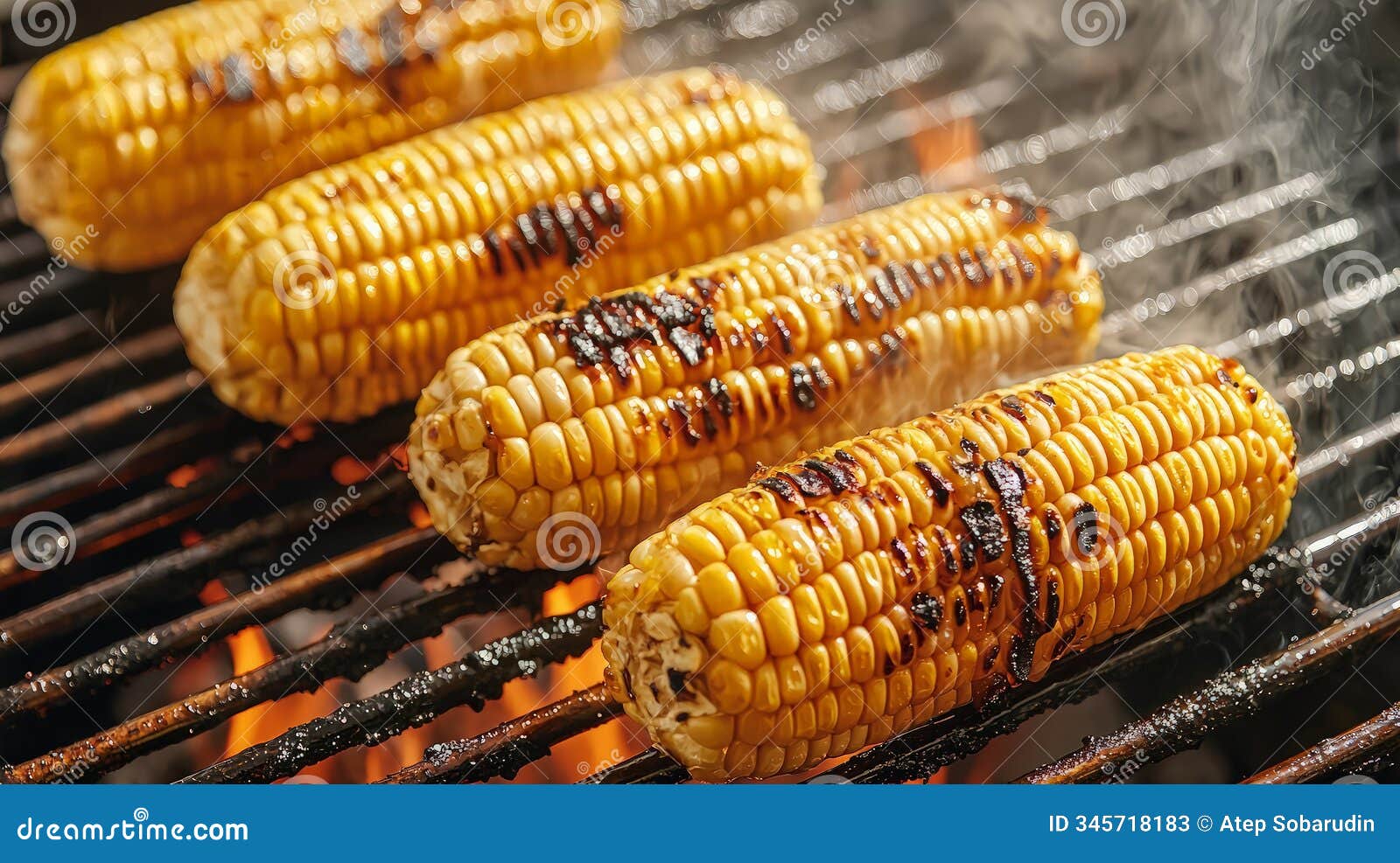 Four Corn Cobs Grilling on a Barbecue, Showing Charring and Smoke Stock ...