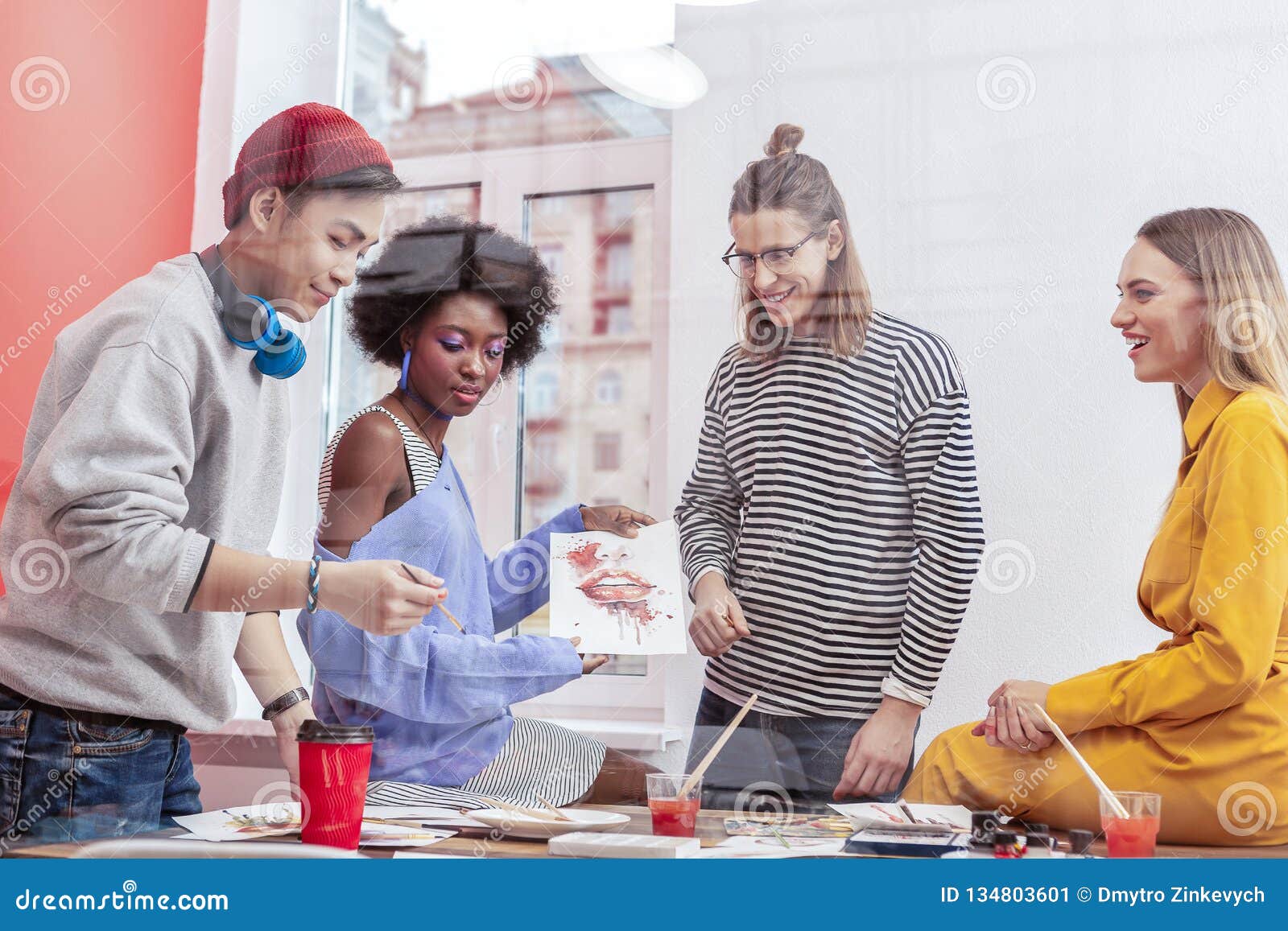 Four Creative Students of Art School Feeling Joyful while Painting ...