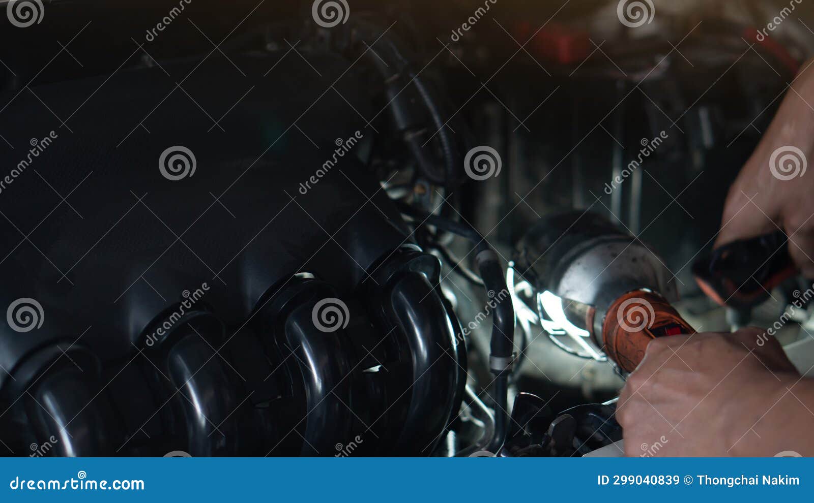 Four-cylinder Engine Illuminated by a Maintenance Torch. Stock Image ...