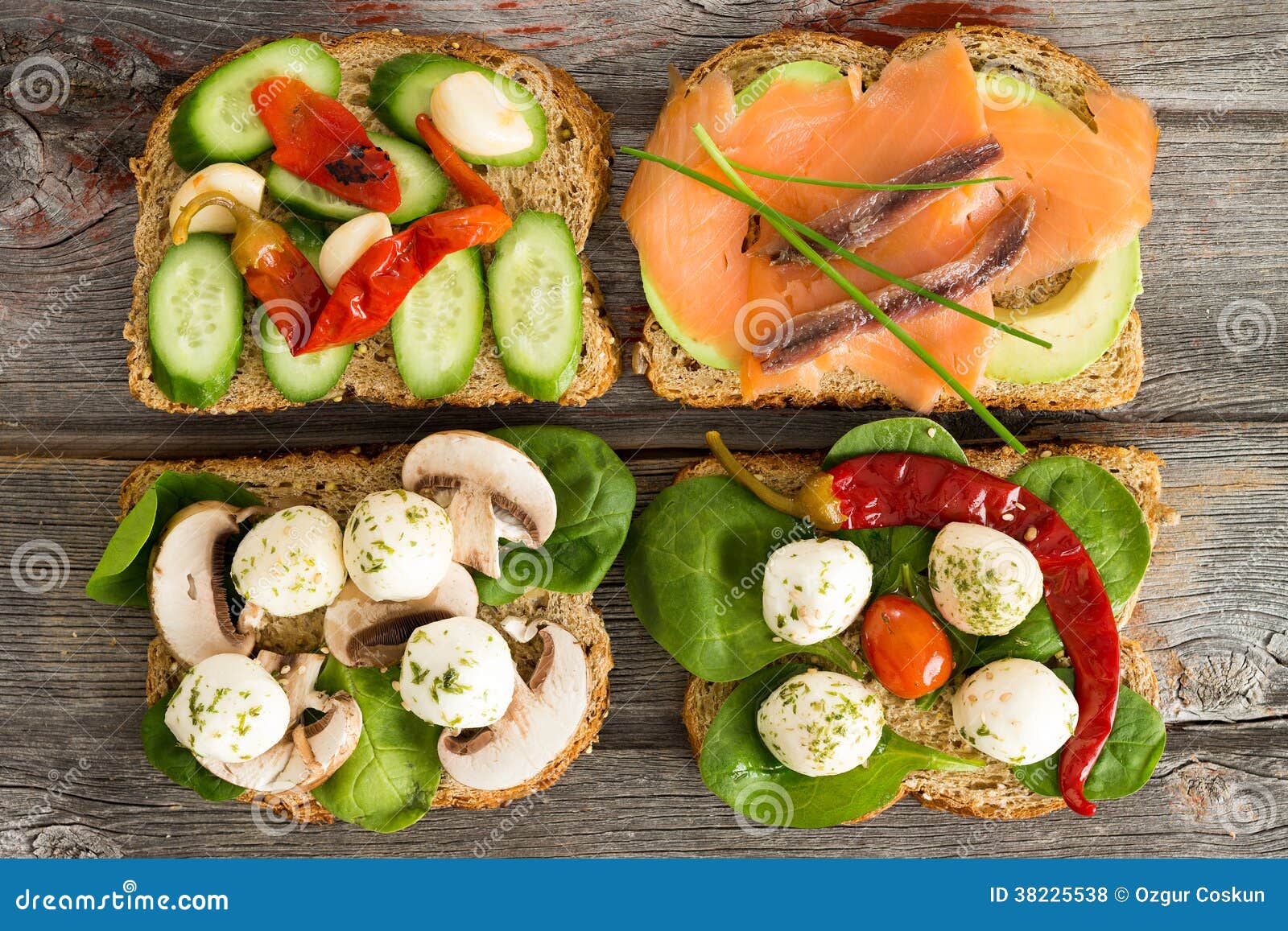 Four Delicious Open Sandwiches on a Picnic Table Stock Photo - Image of ...