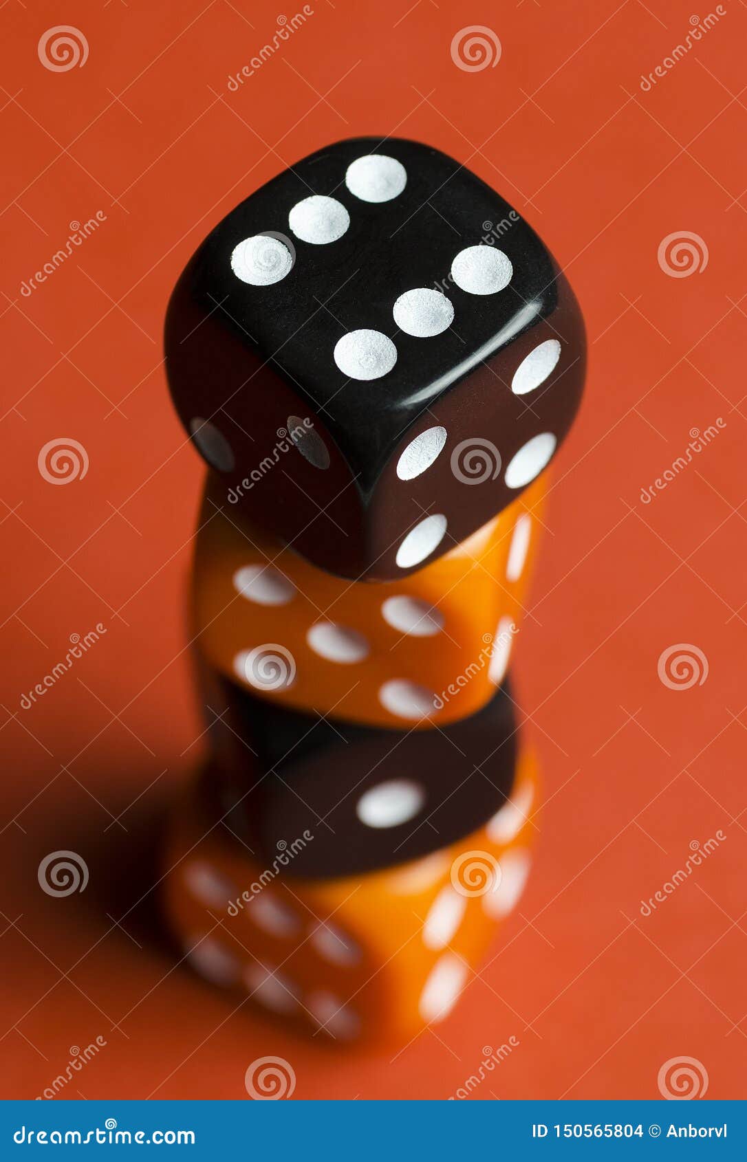 Column Of Dice And One Hand Placing Them On Top Of Each Other Stock ...