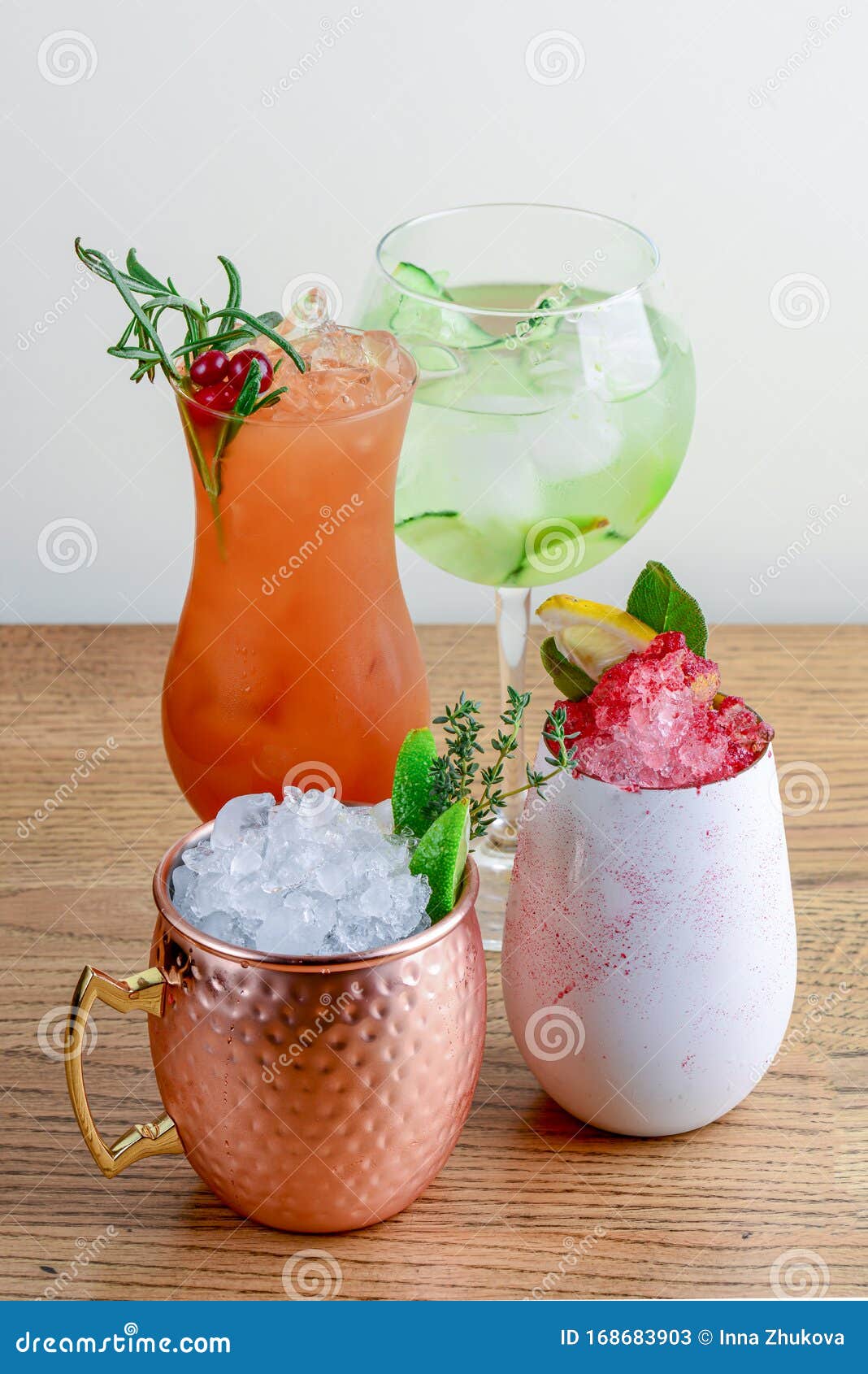 Four Different Assorted Cocktail Drinks Made with Alcohol and Fruit ...