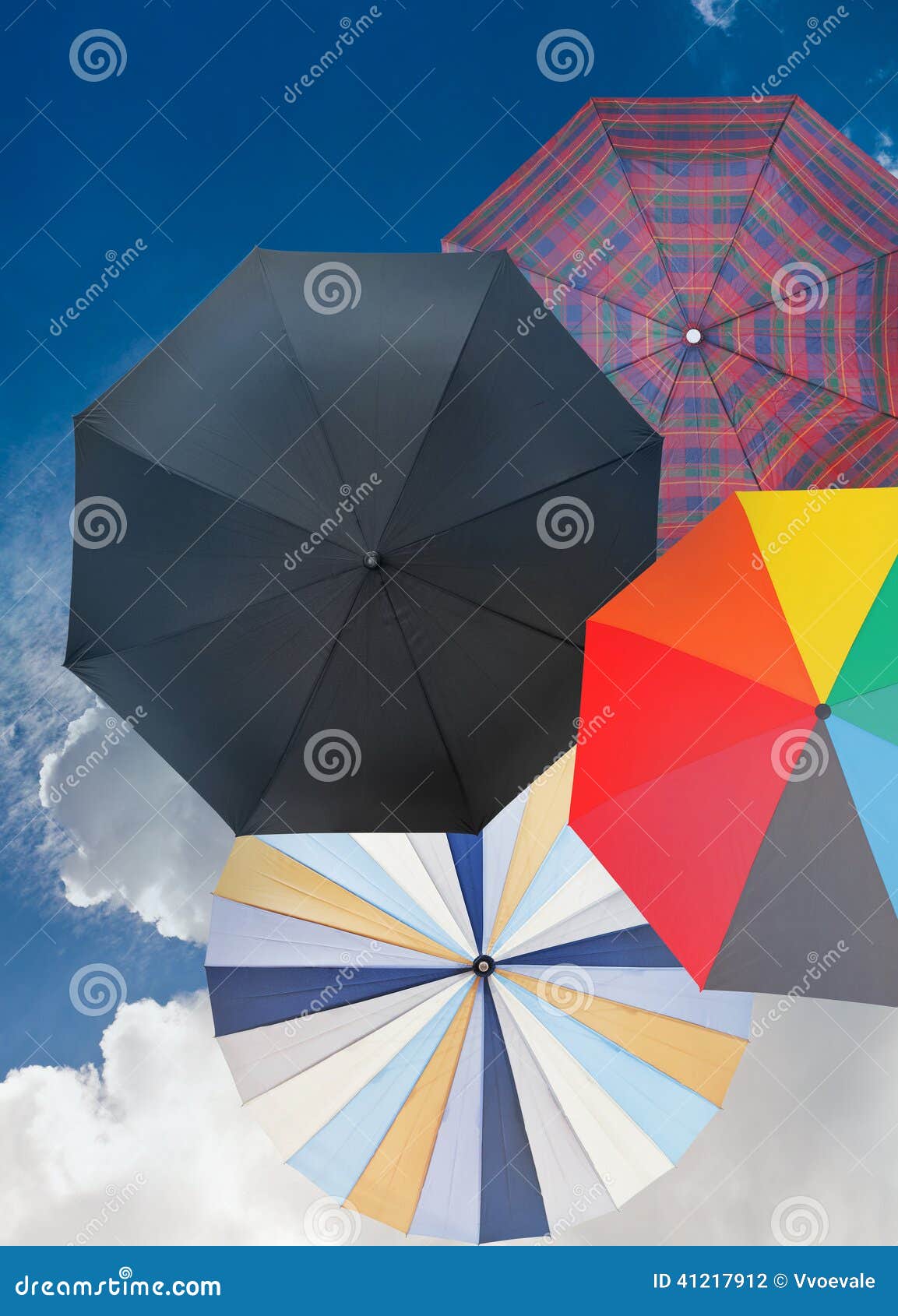 Four Different Open Umbrellas with Dark Blue Sky Stock Photo - Image of ...