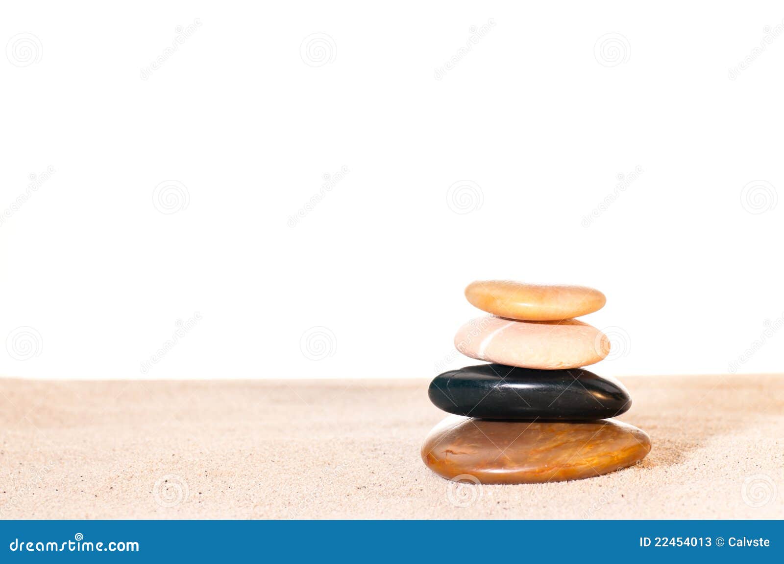 Four Different Stones Stacked on Sand Stock Image - Image of sand ...