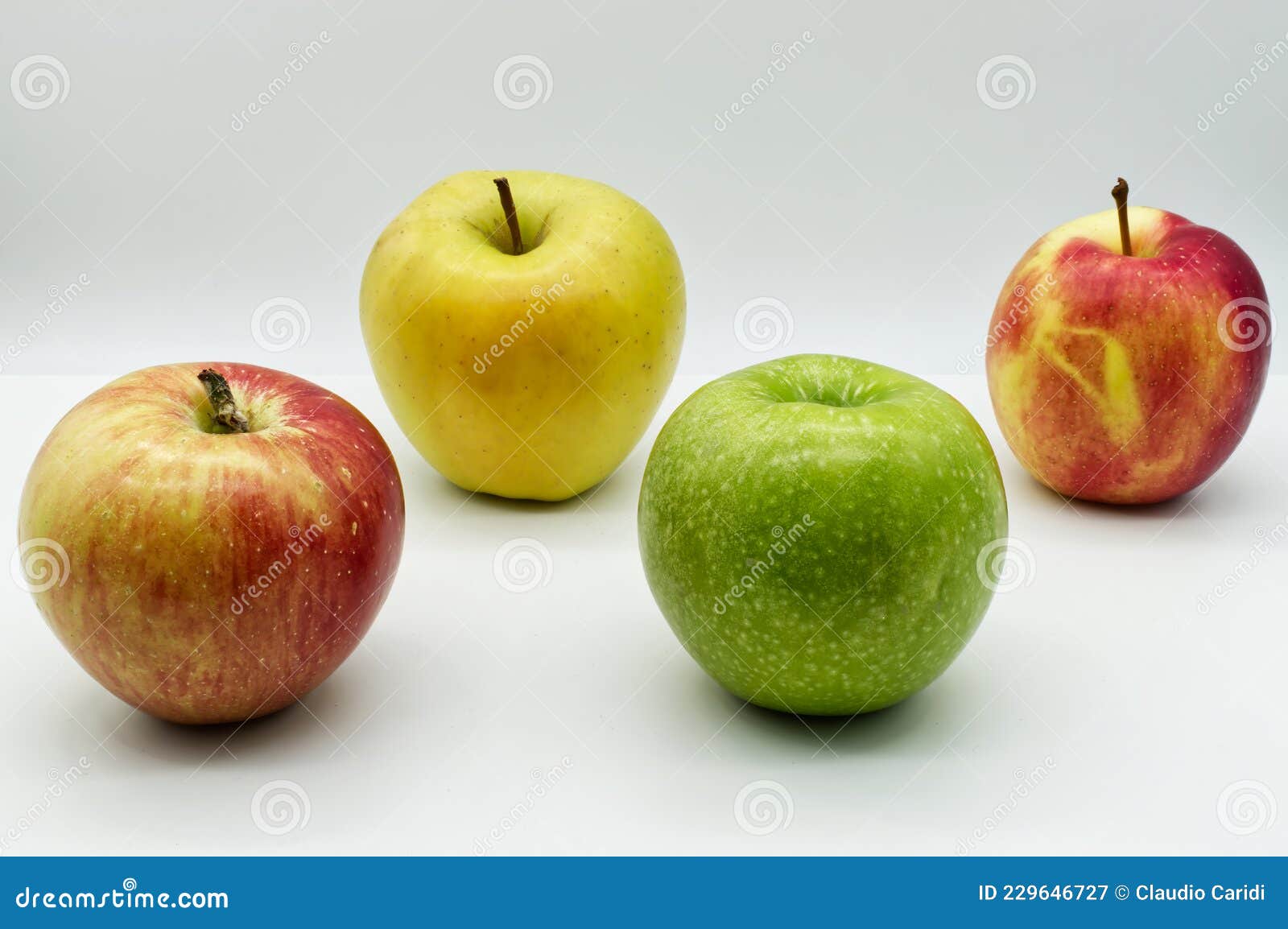 Four Different Varieties of Ripe Apples Isolated on White Background ...