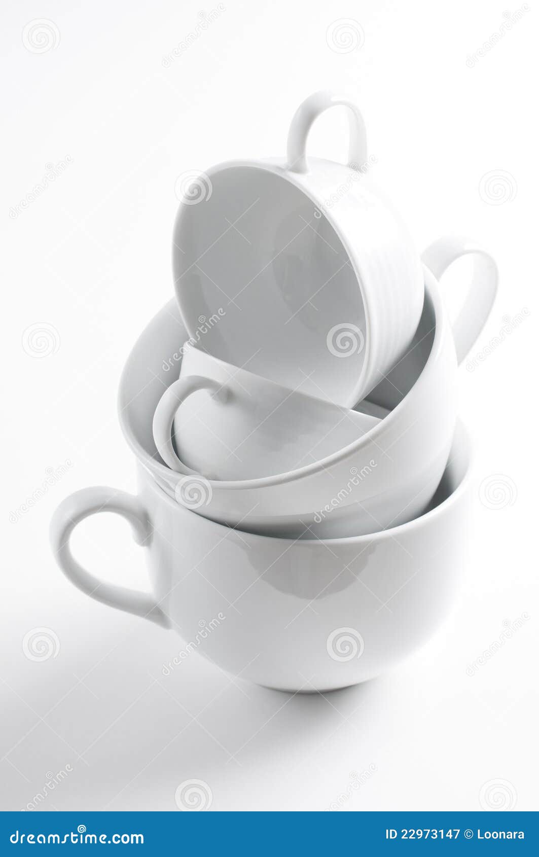 Four different white cups stock image. Image of stack - 22973147