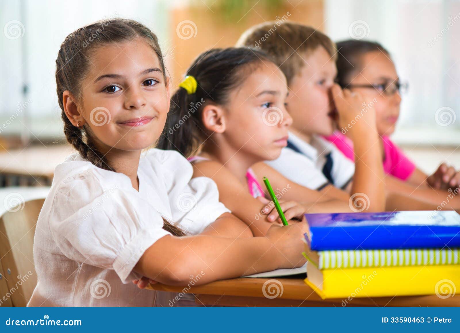 Four Diligent Pupils Studying at Classroom Stock Image - Image of ...