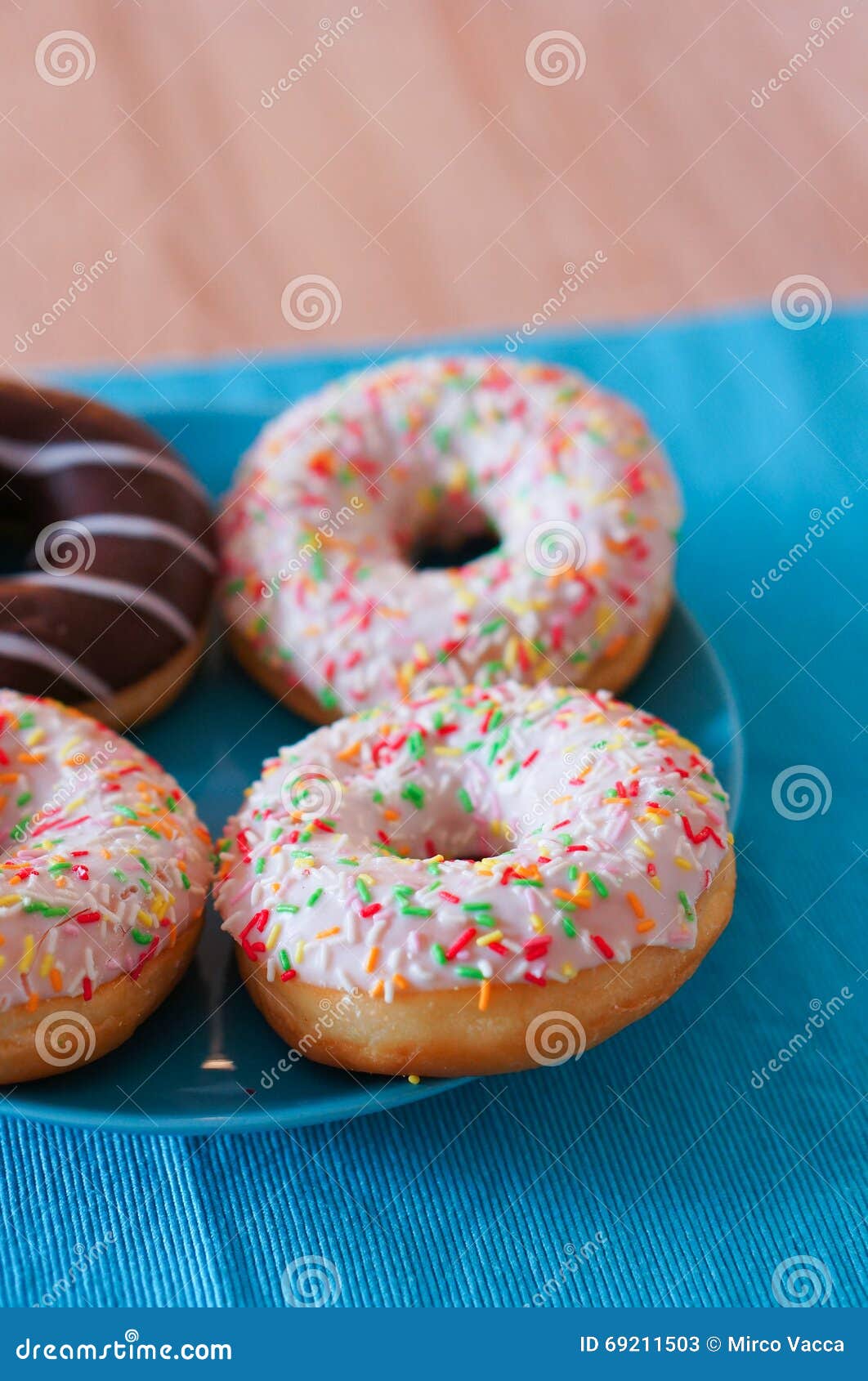 Four donuts stock image. Image of chocolate, donuts, plate - 69211503