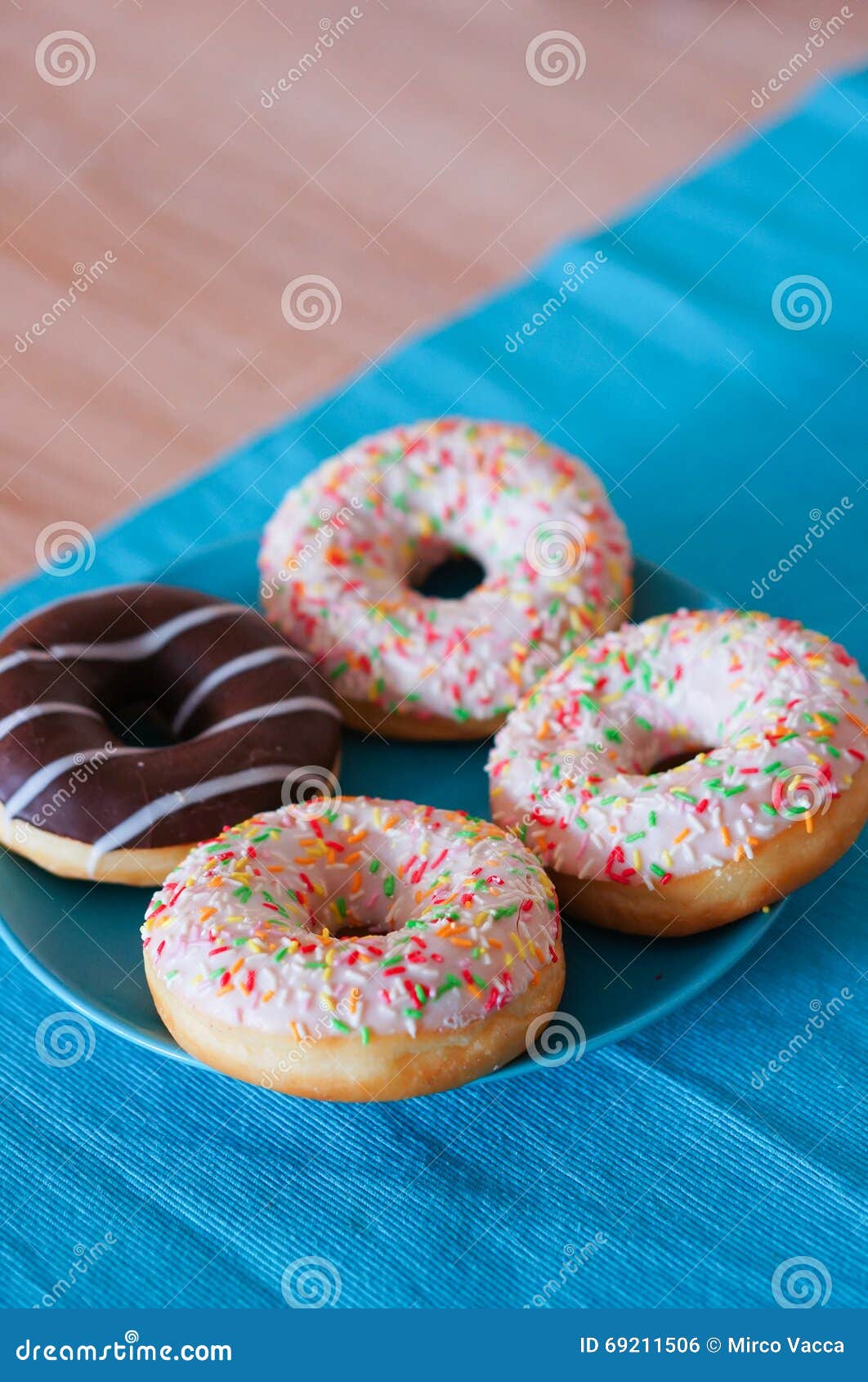 Four donuts stock photo. Image of sweet, baked, plate - 69211506