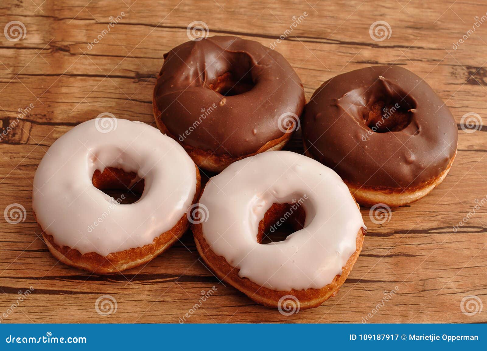 Four doughnuts stock image. Image of round, treat, doughnuts - 109187917
