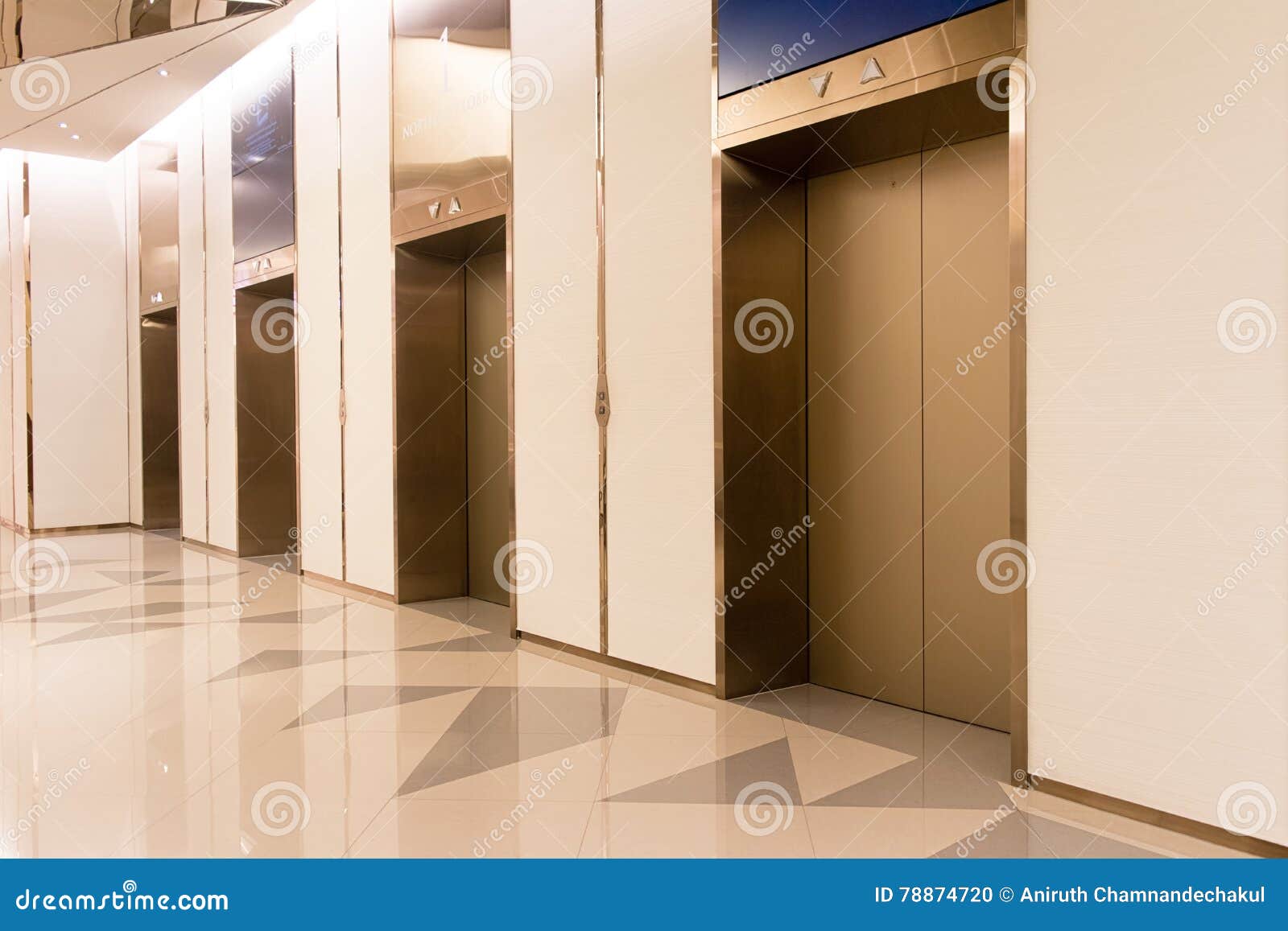 Four Elevators in Hotel Lobby. Stock Photo - Image of open, button ...
