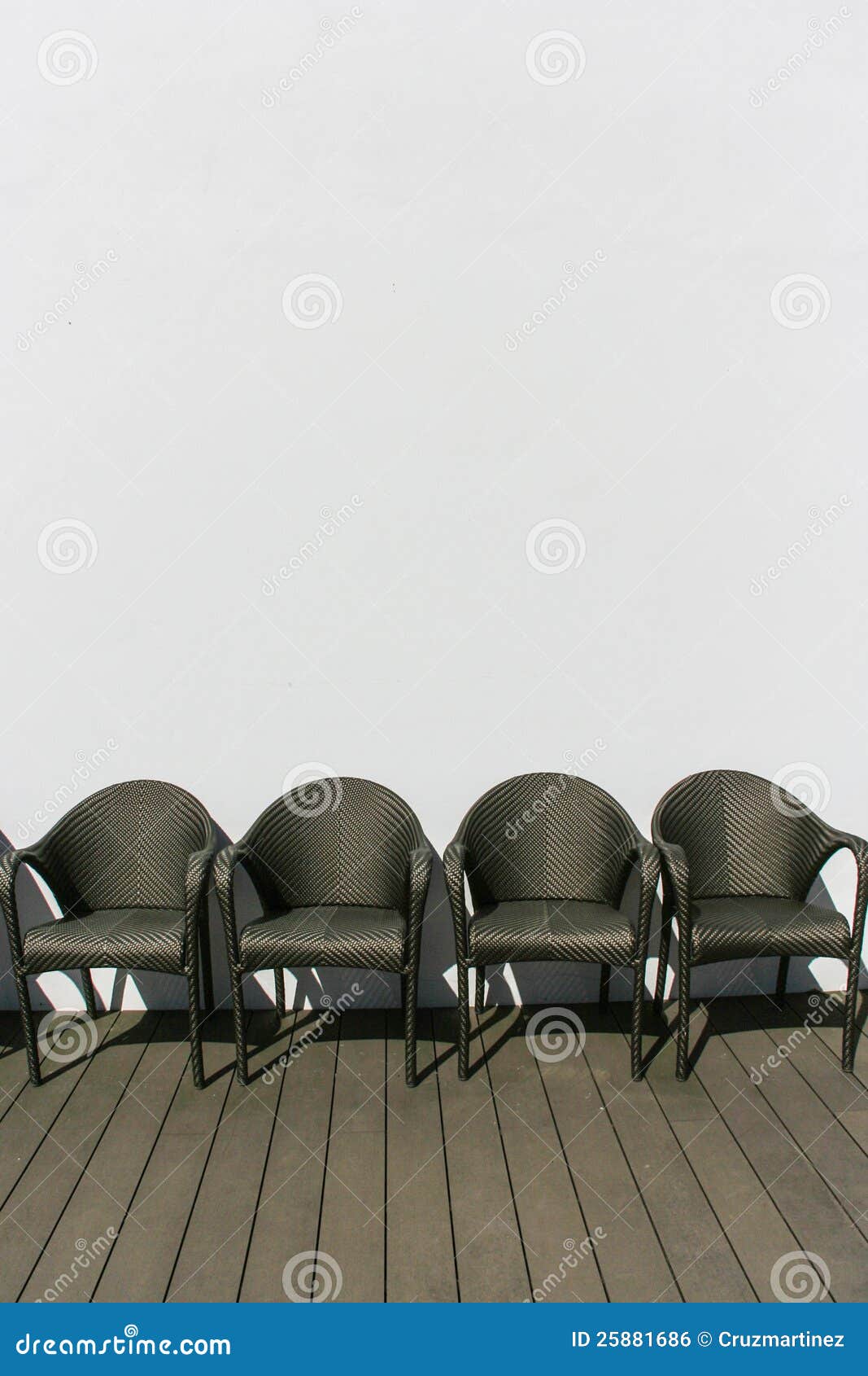 Four Empty Woven Chairs stock photo. Image of gray, floor - 25881686