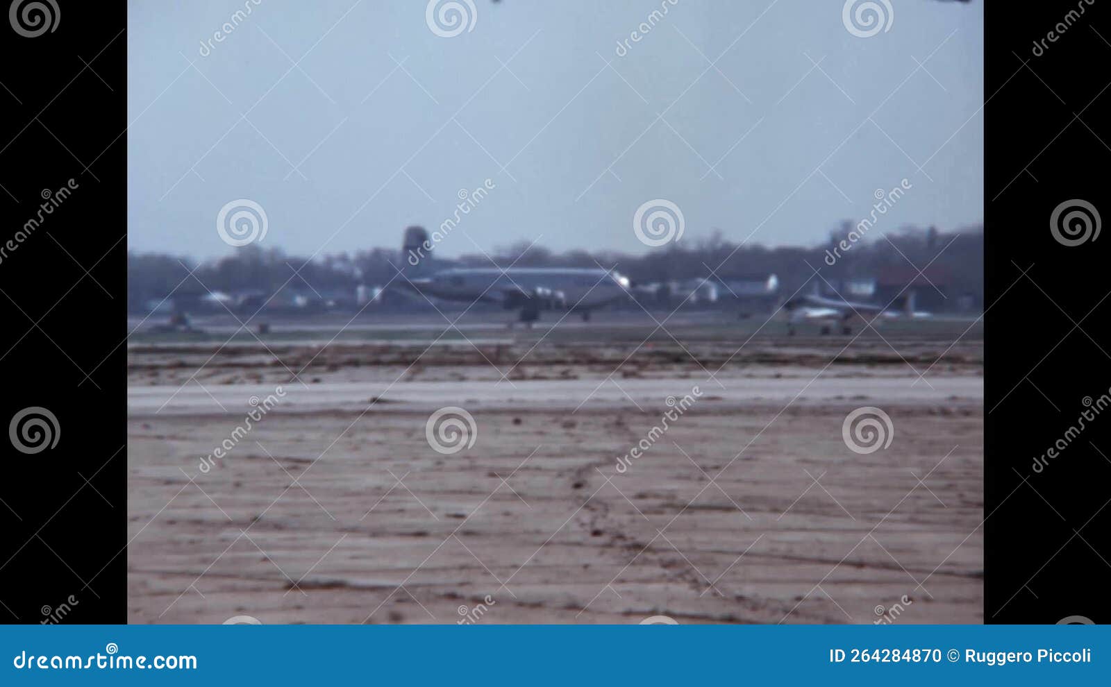 Four-engine Propeller Cargo Aircraft with Metallic Gray Lines Up on the ...