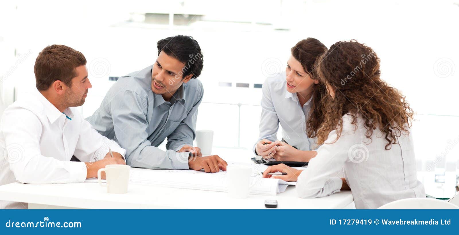 Four Engineers Discussing New Project Stock Photos - Free & Royalty ...