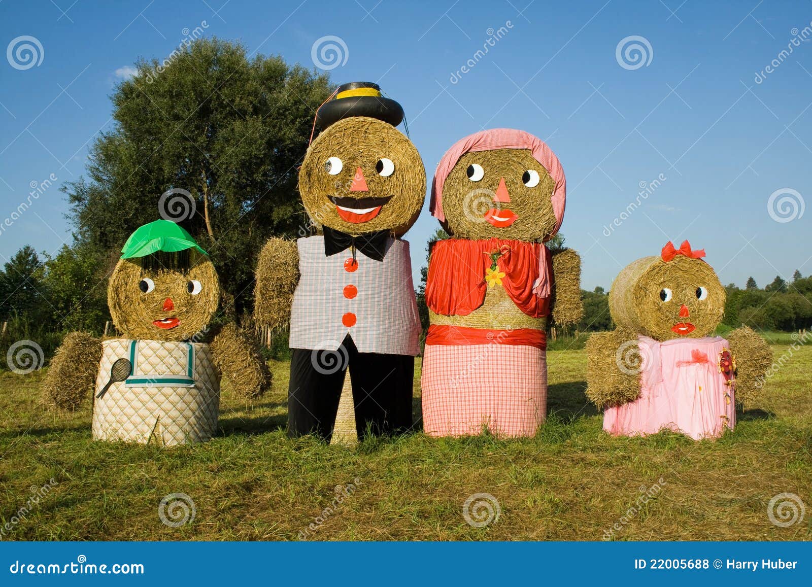 Four Figures Made Out of Straw Bales Stock Photo - Image of straw, life ...