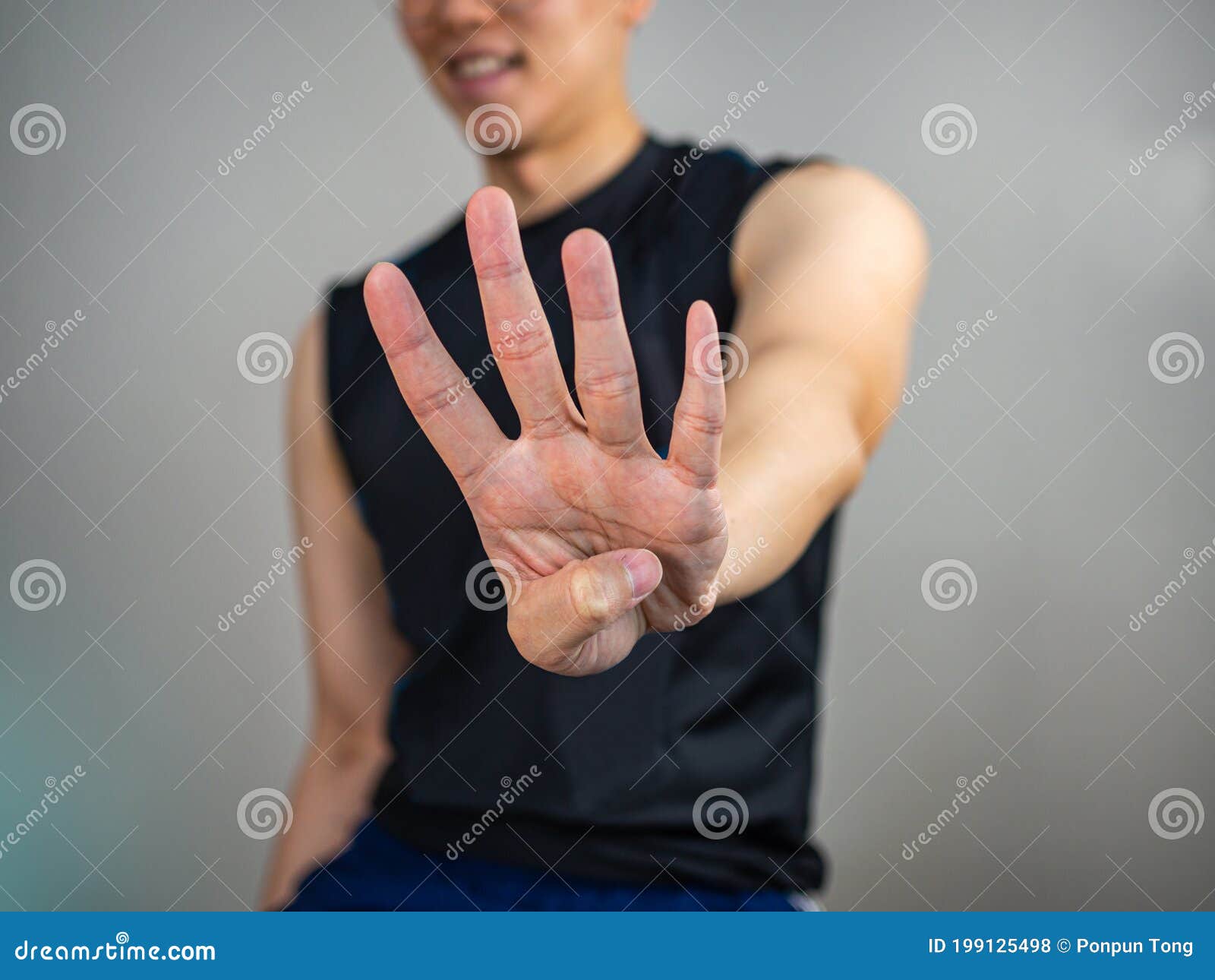 Four Finger Gesture by Man Wearing Sport Clothes Stock Photo - Image of ...