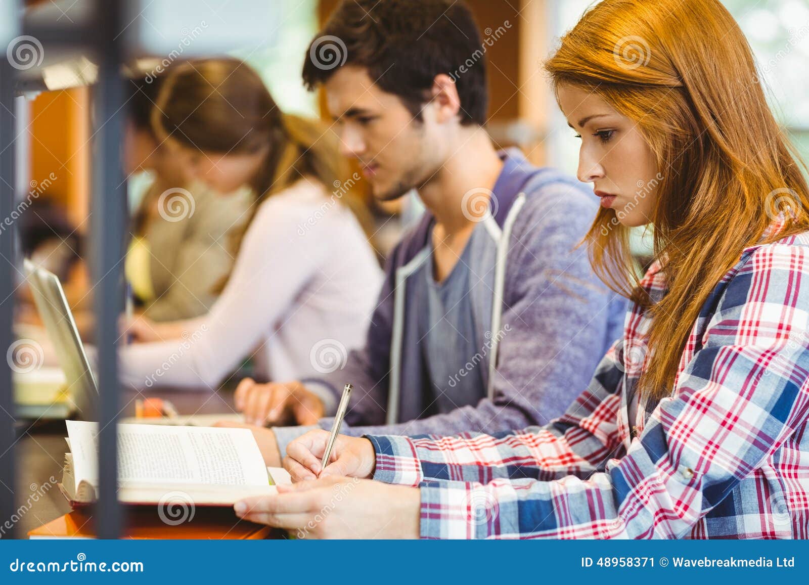 Four Focused Classmates Working Together Stock Image - Image of college ...