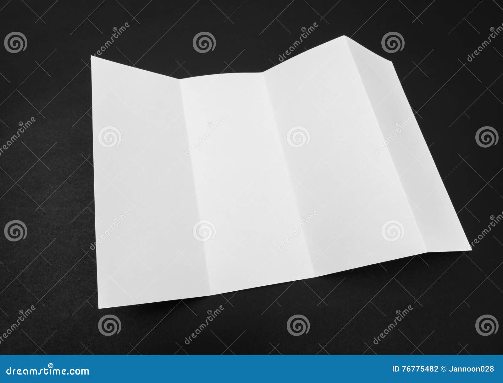 Four - Fold White Template Paper on Black Background . Stock Photo ...