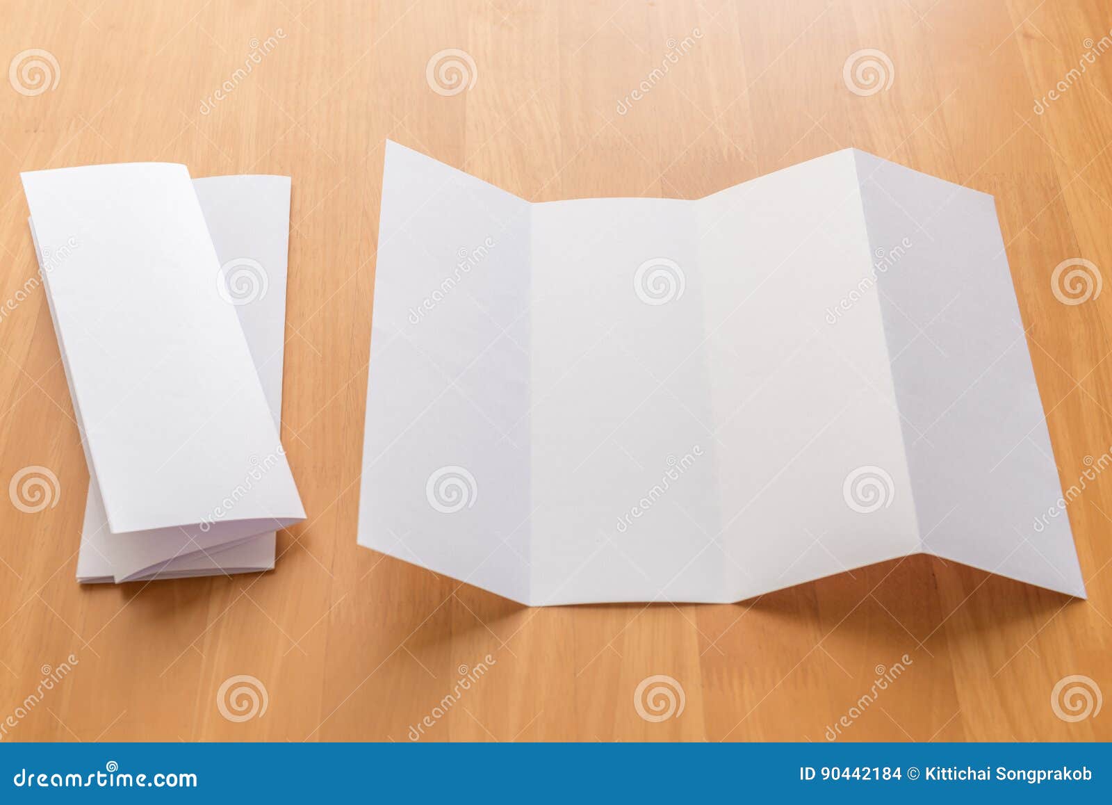 Four - Fold White Template Paper On Wood Texture . Stock Photo ...