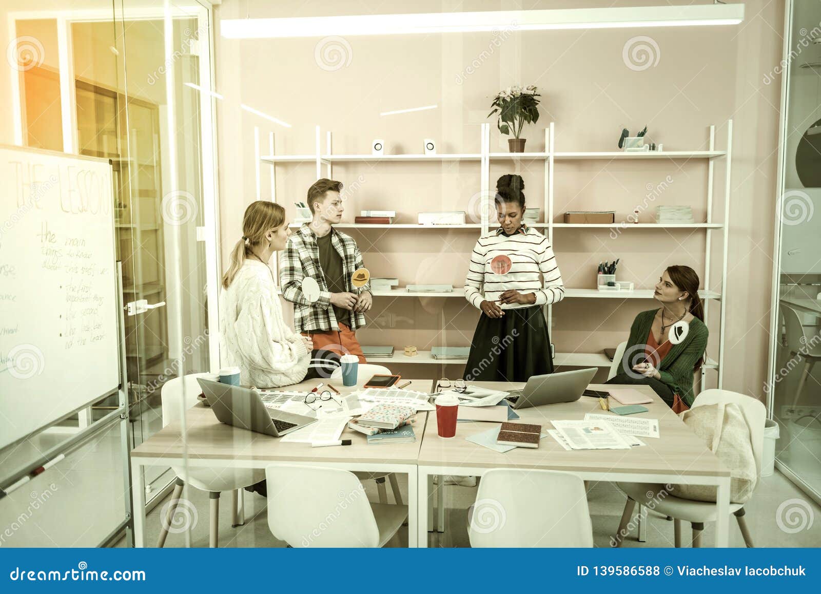 Four Freelancers Using Thinking Hats for Discussing New Project Stock ...