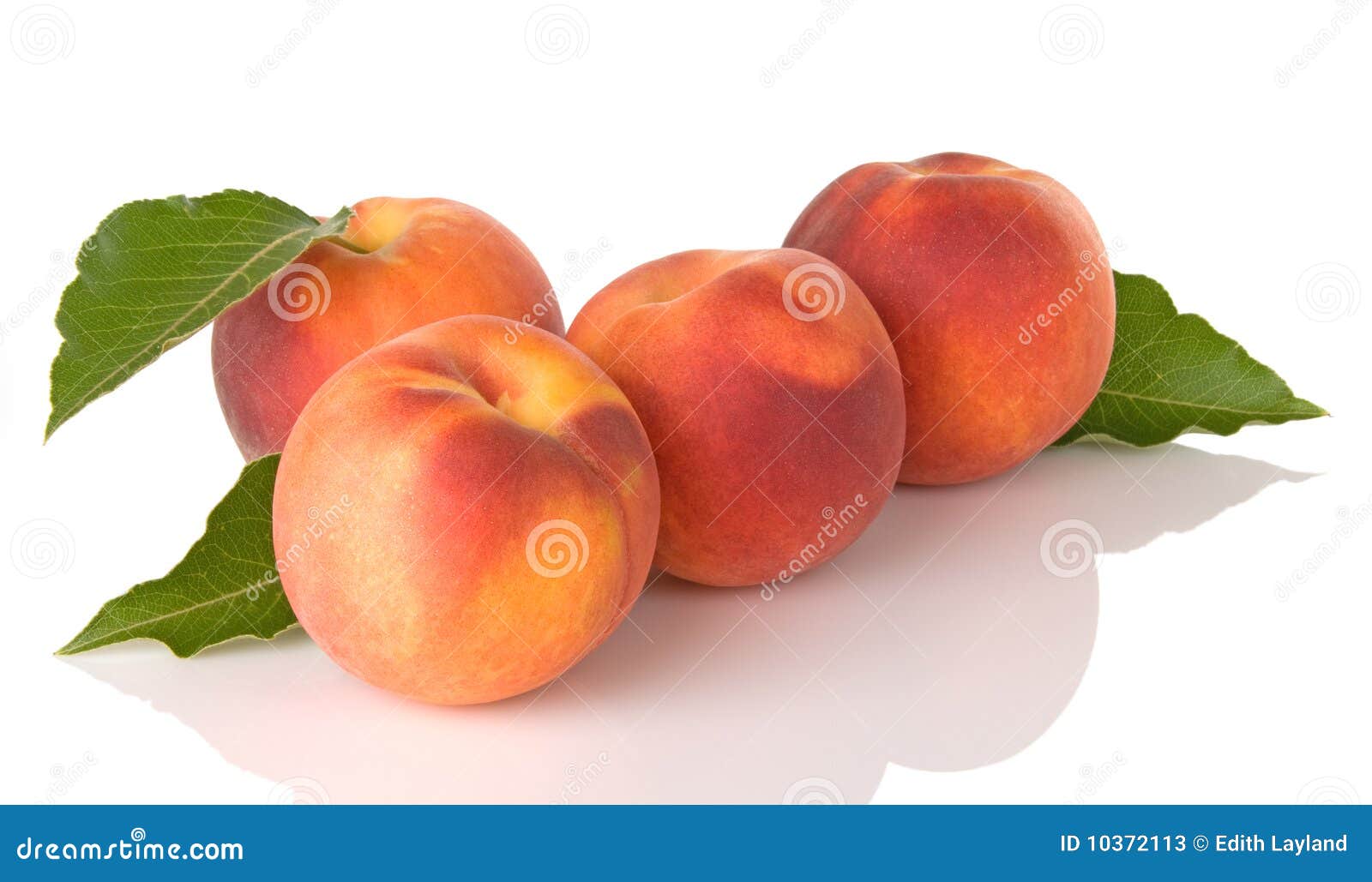 Four Fresh Peaches with Leaves Stock Image - Image of background ...