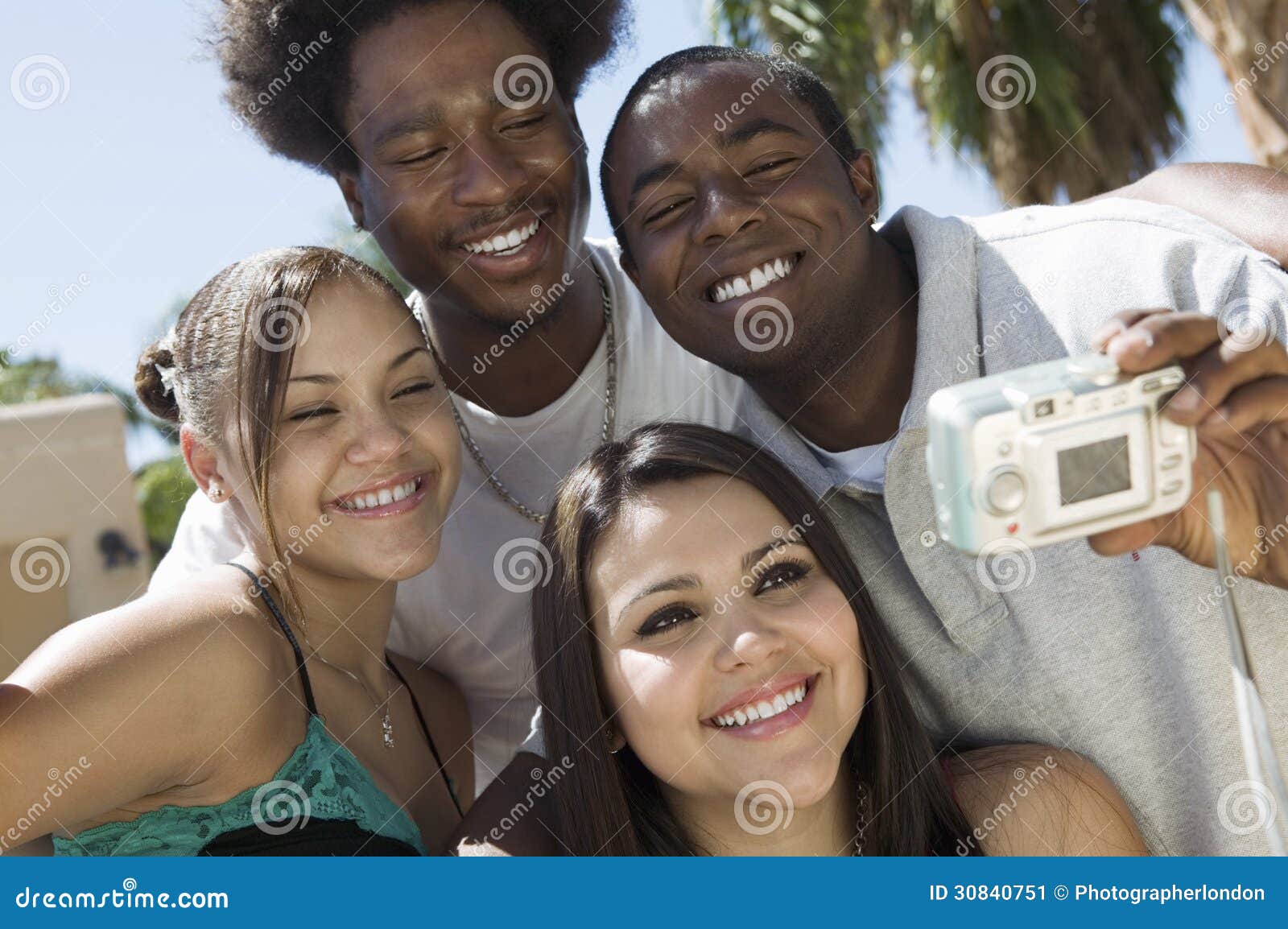 Four Friends in Back Yard Photographing Selves Stock Image - Image of ...
