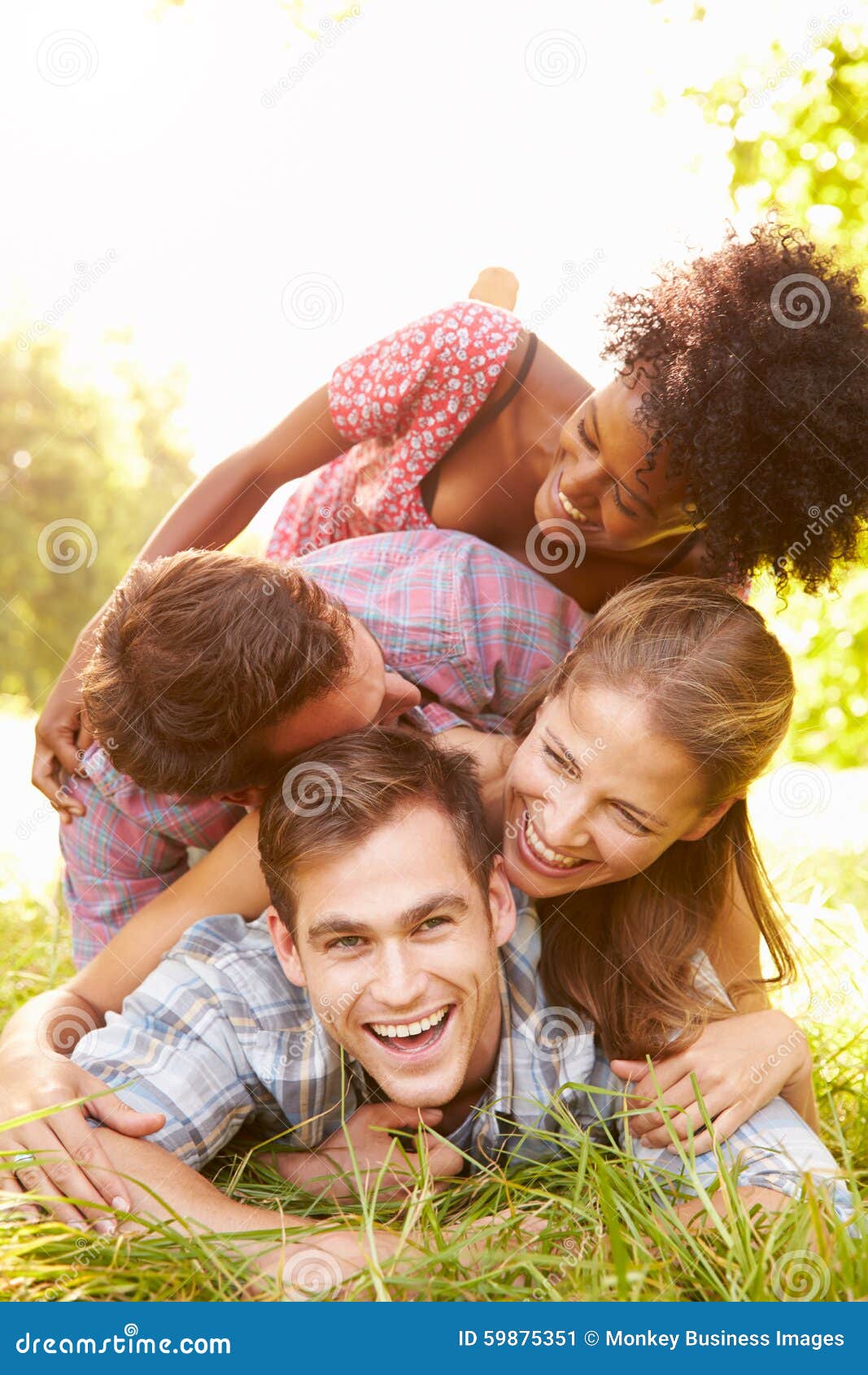 Four Friends Having Fun Together in the Countryside Stock Image - Image ...