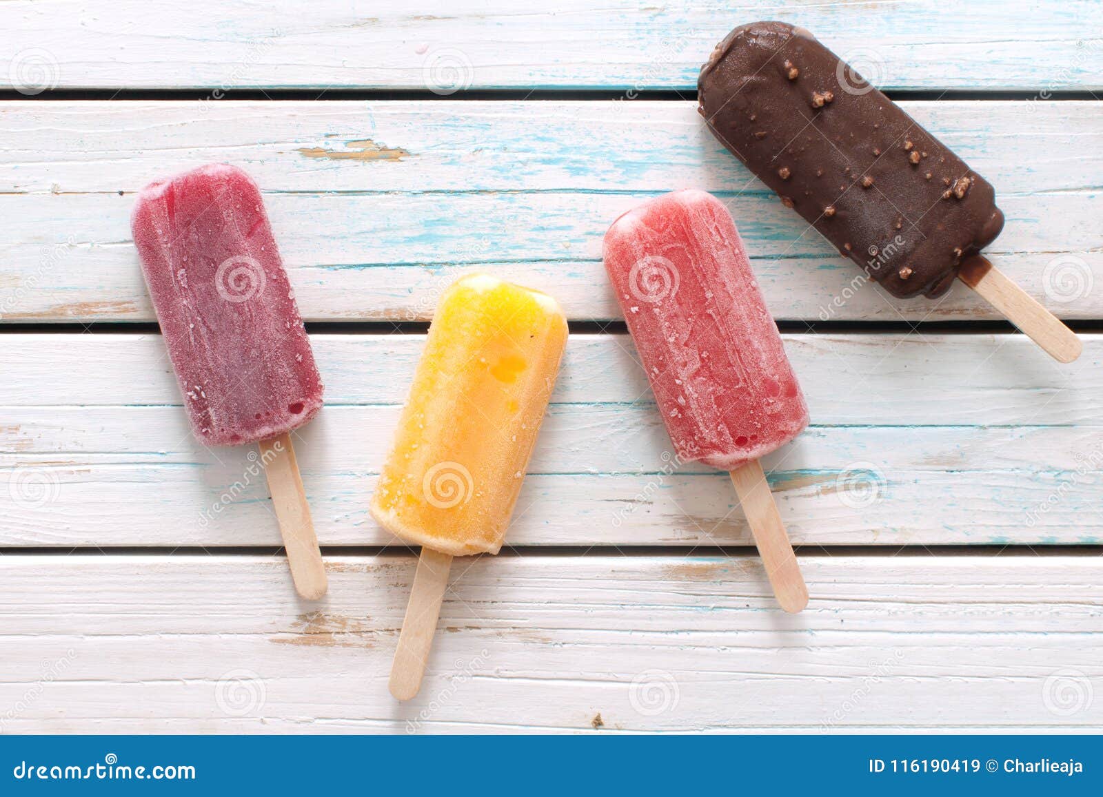 Four frozen popsicles stock image. Image of chocolate - 116190419