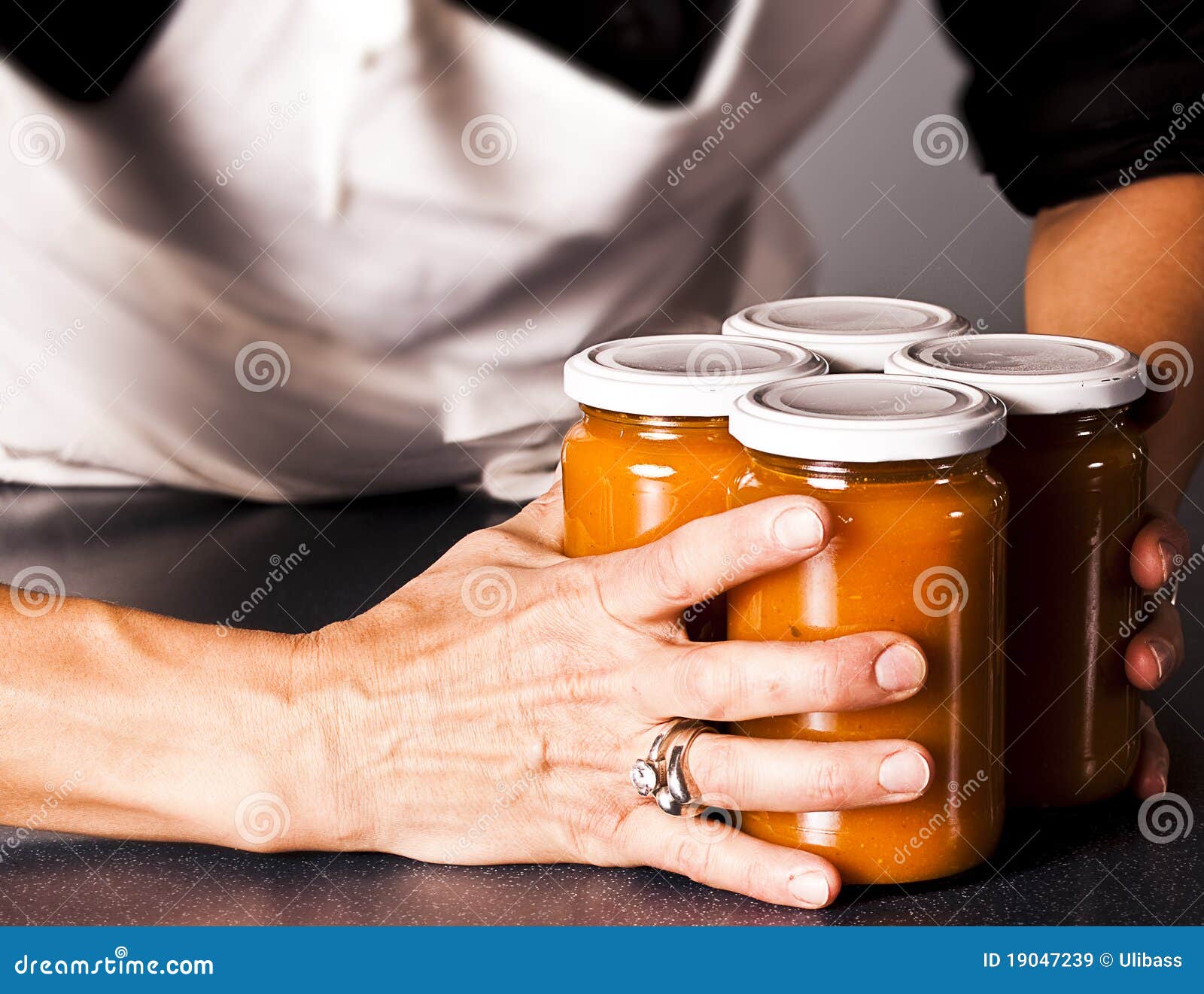 Four Fruit Jars in a WomanÂ´s Hand Stock Image - Image of cookbook ...