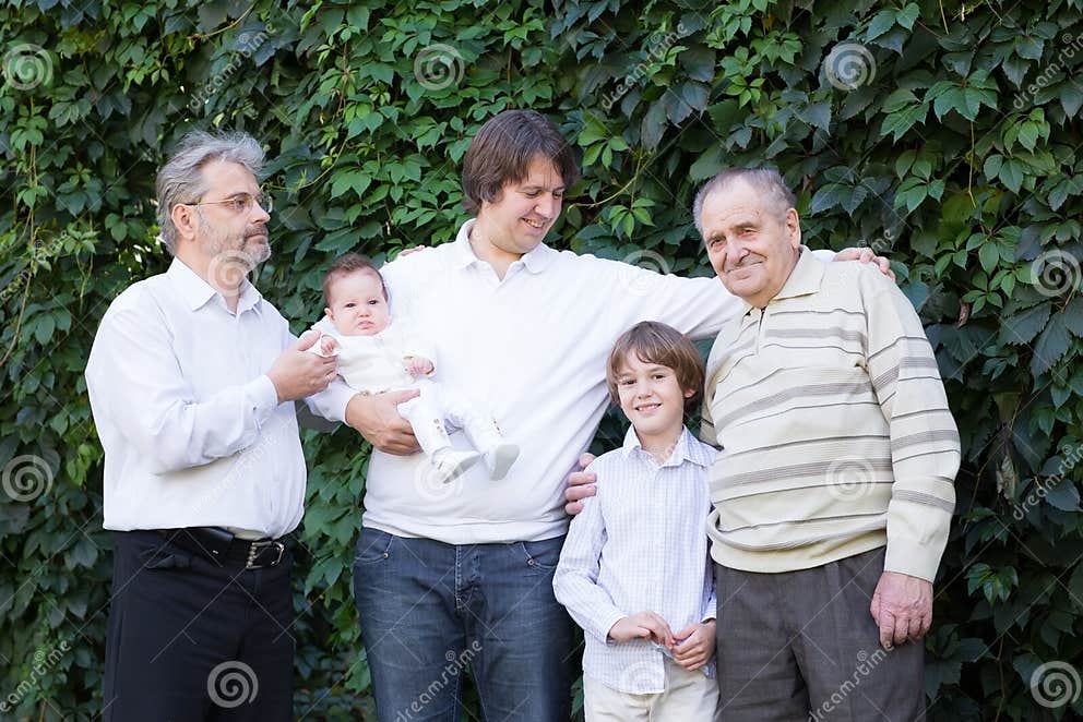 Four Generations of Men Standing in the Garden Stock Image - Image of ...