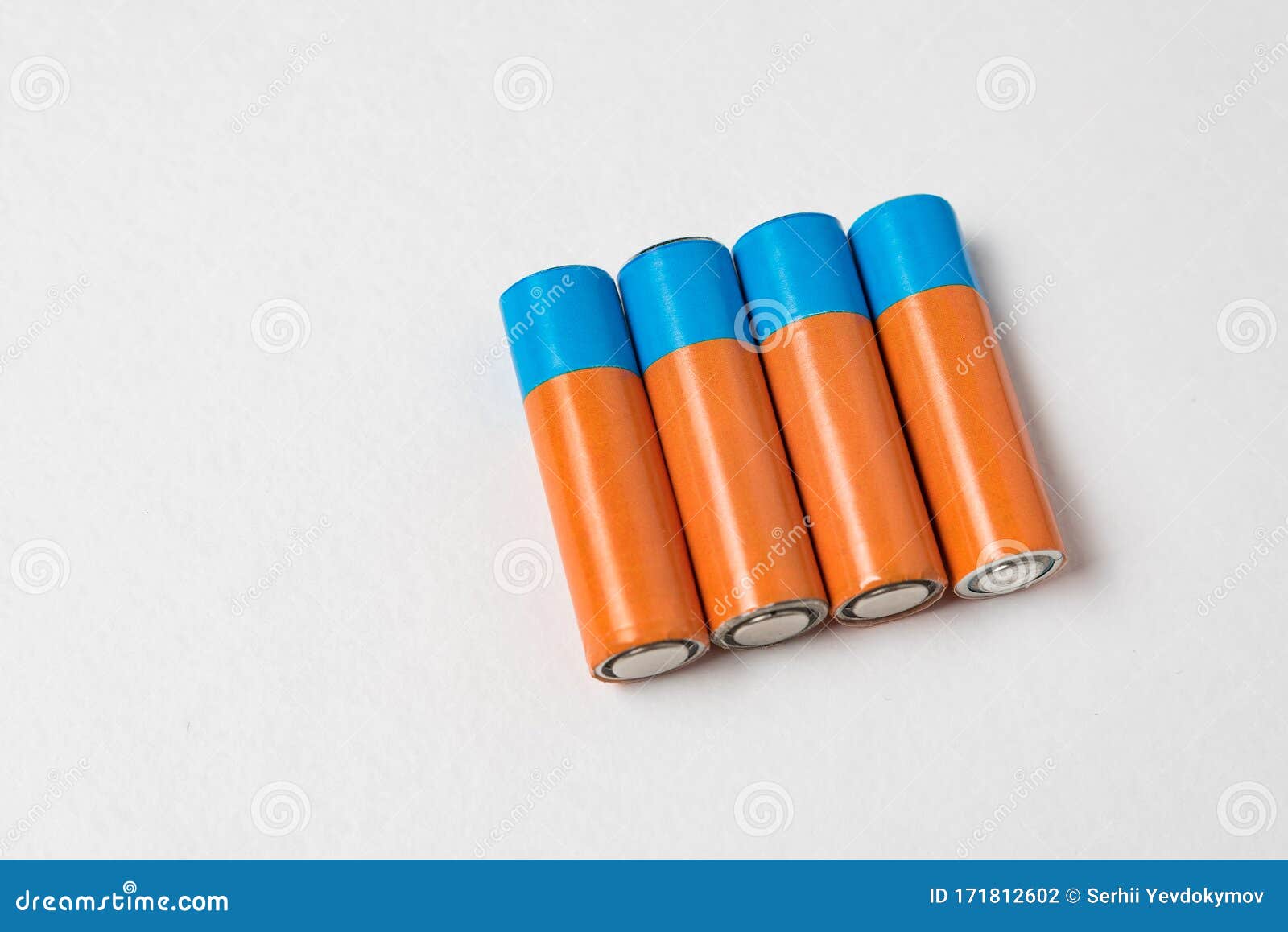 Four Generic AA Batteries on a White Background. Copy Space Stock Photo ...