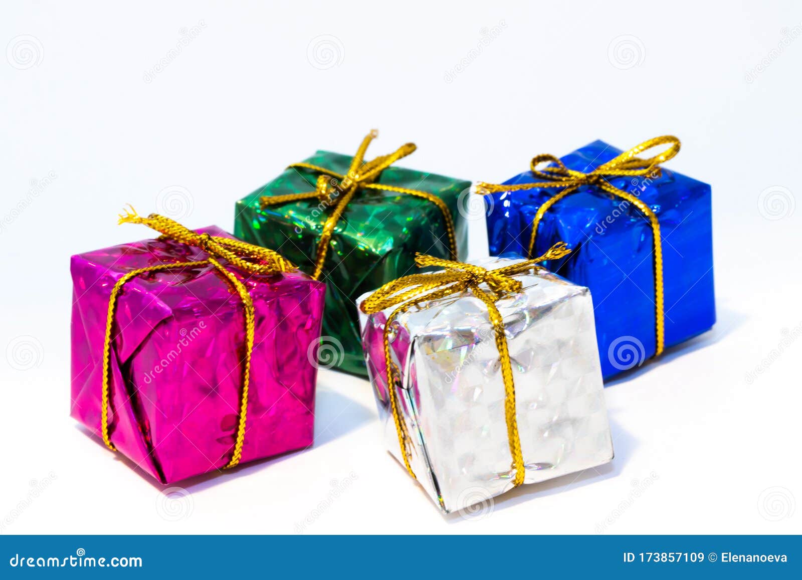 Four Gift Boxes with Golden Ribbon on White Stock Image - Image of ...