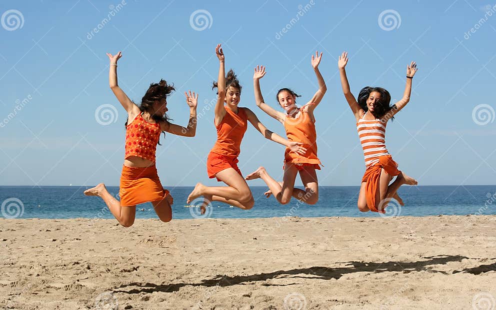 Four girls jumping stock image. Image of jump, play, jumping - 1634917