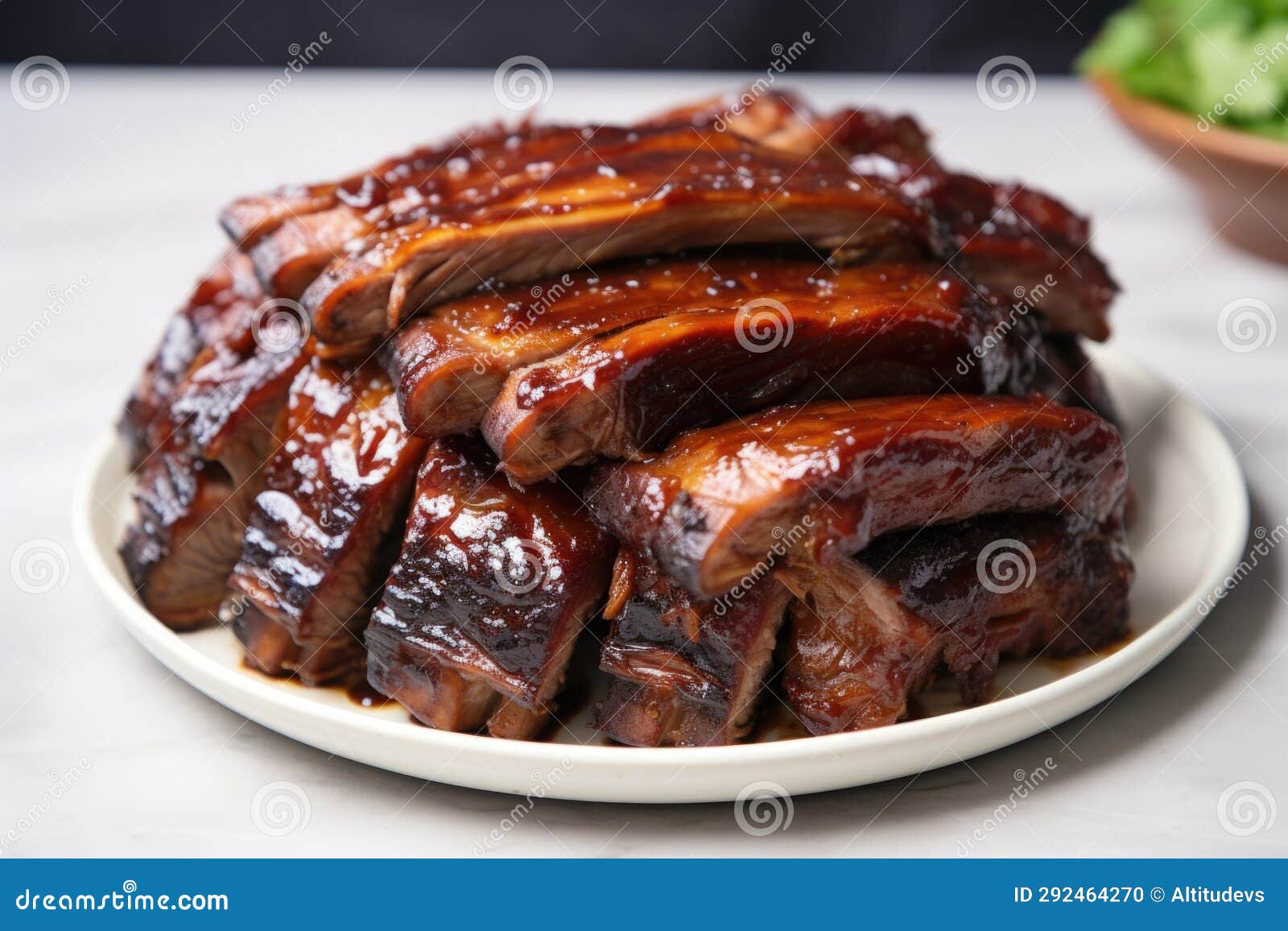 Four Glazed Pork Ribs Arranged in a Half-circle on a Round Plate Stock ...