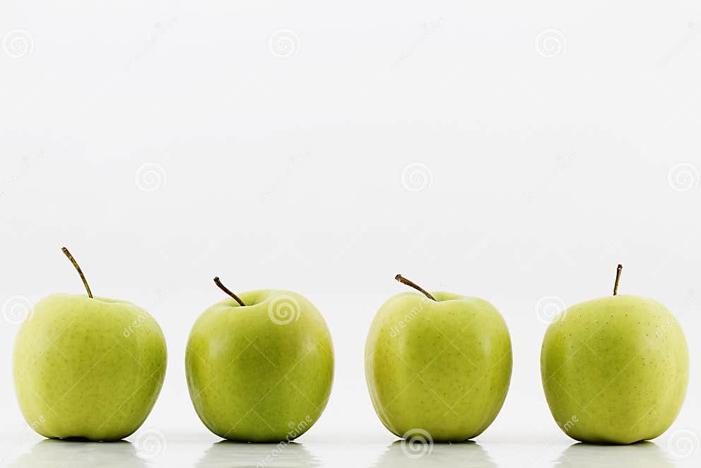Four green apples stock photo. Image of healthy, freshness - 14216614