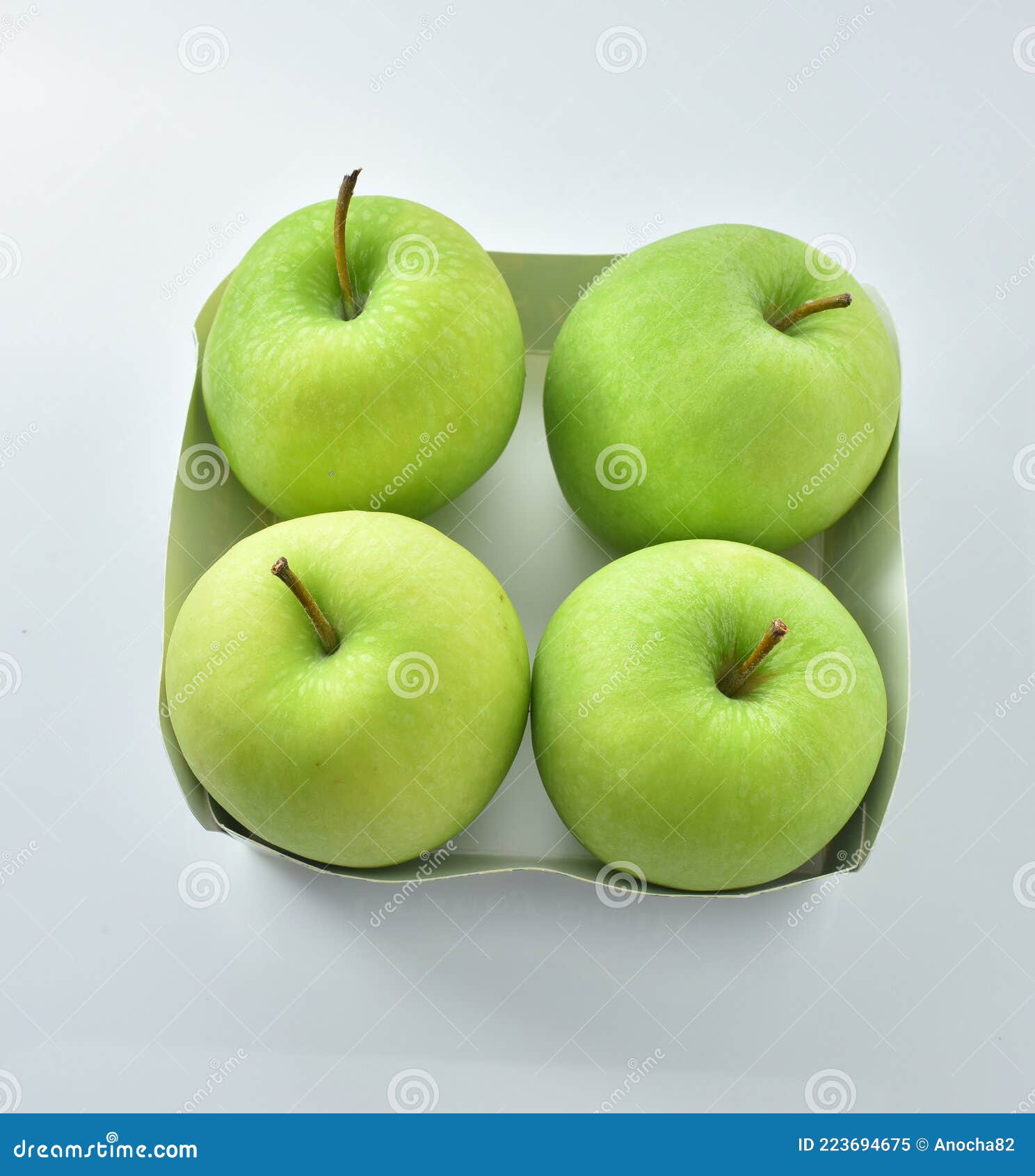 Four Green Apples in a Cardboard Box Stock Image - Image of closeup ...
