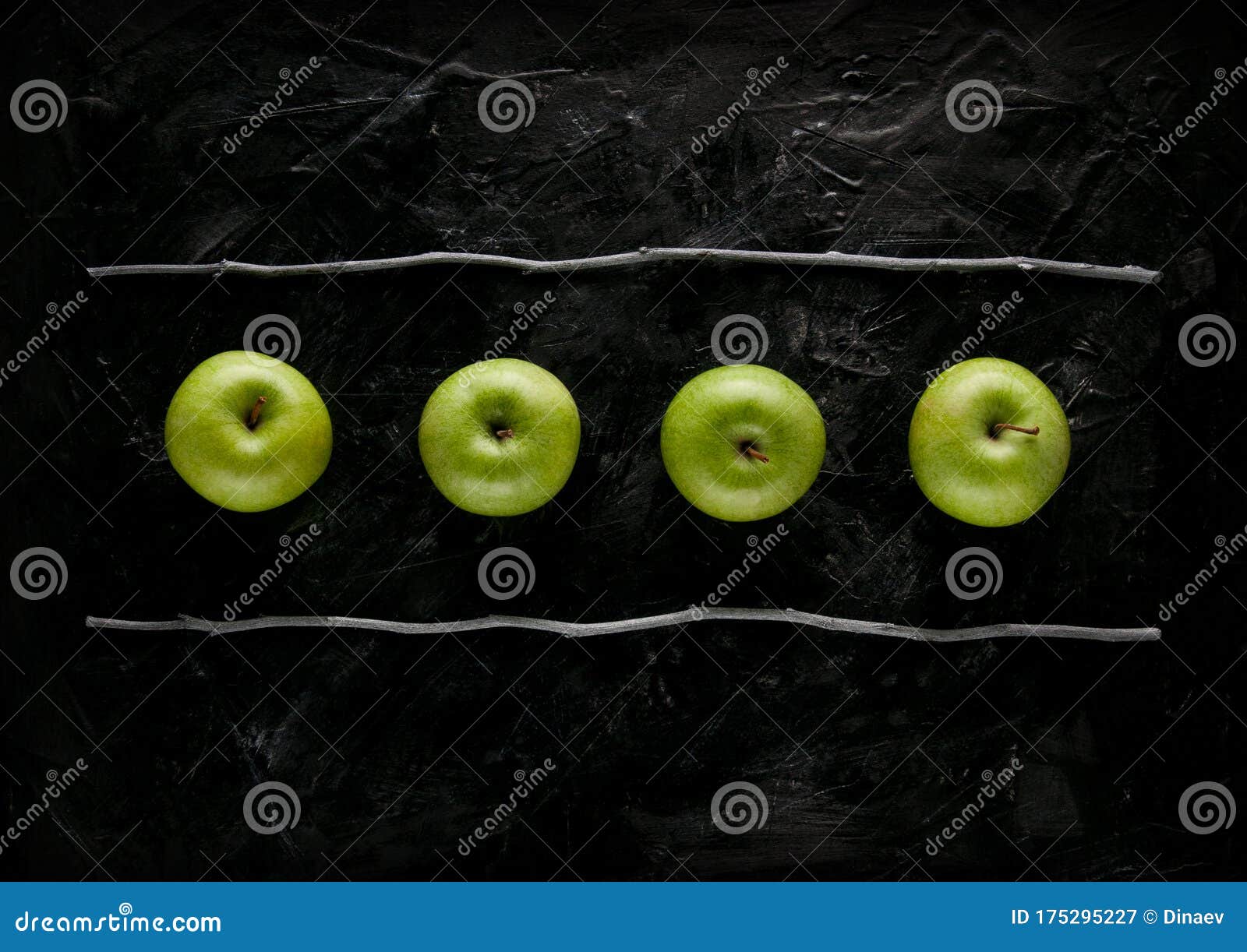 Four Green Fresh Apples Lie Linearly on a Stone Black Table in the ...