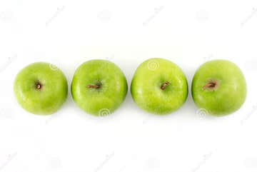 Four green apples in a row stock image. Image of dieting - 7363621