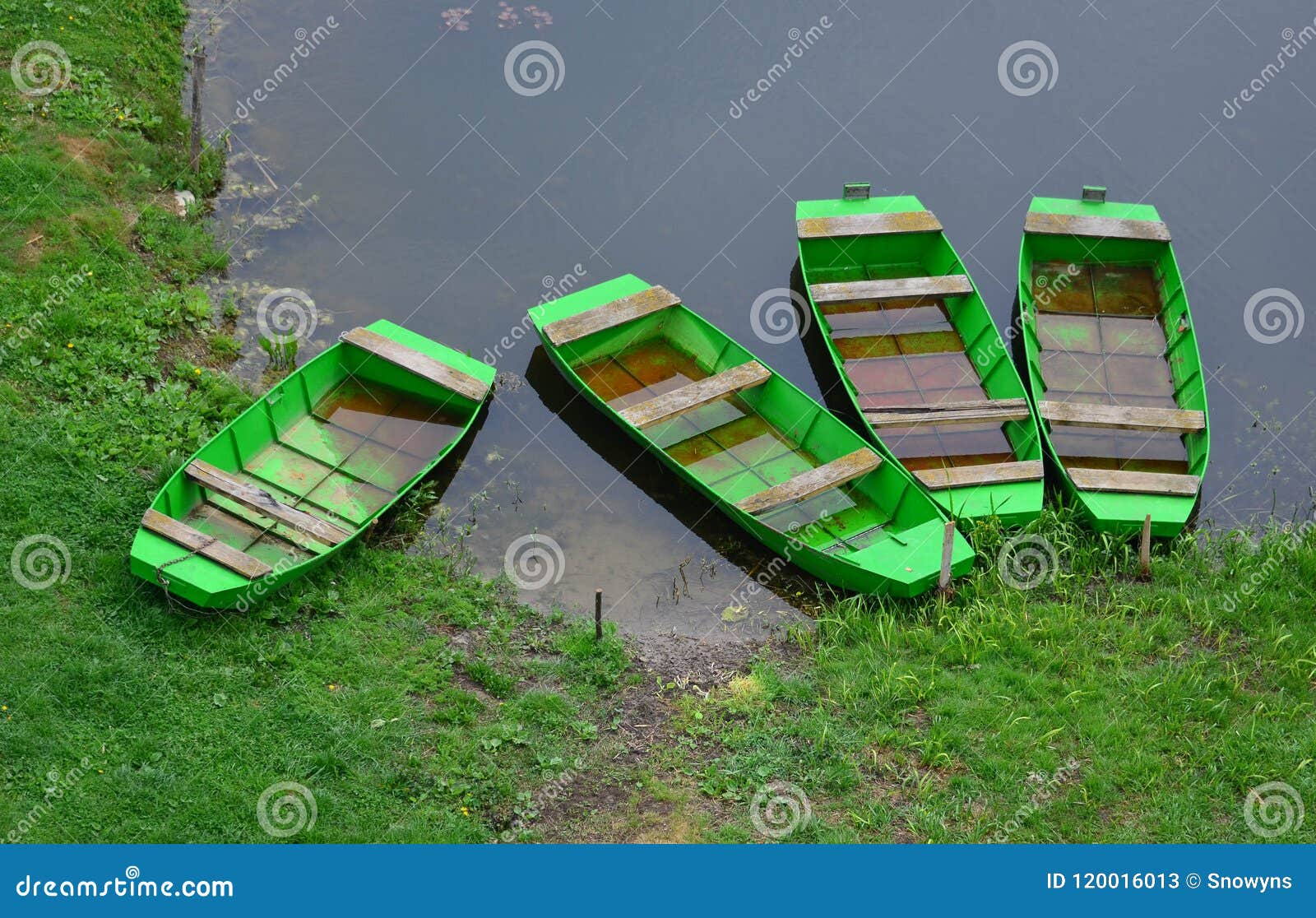 Four green boats stock image. Image of protected, wild - 120016013