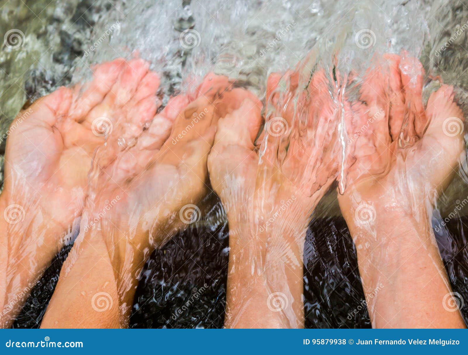 Four Hands on Water Stream stock photo. Image of hands - 95879938