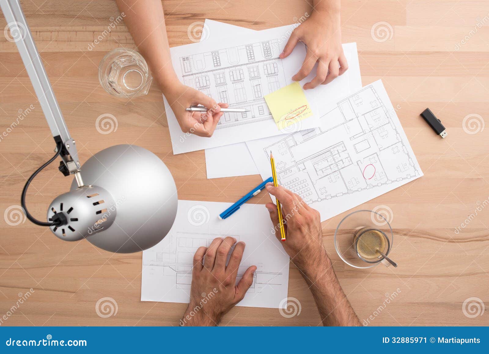 Four Hands Working on a Desk Stock Image - Image of work, workspace ...