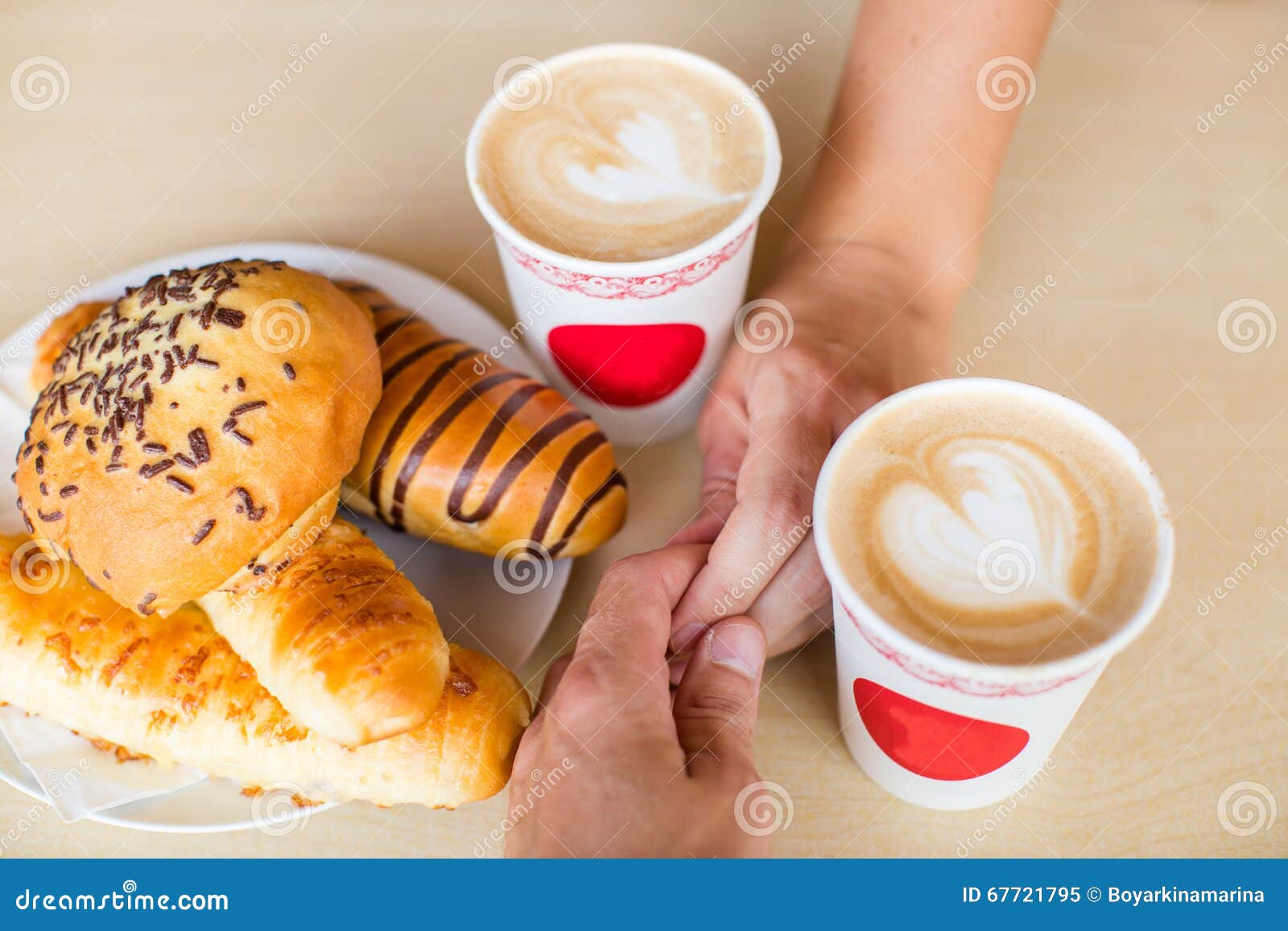 Four Hands Wrapped Around a Cup of Coffee with Heart Drawing Stock ...