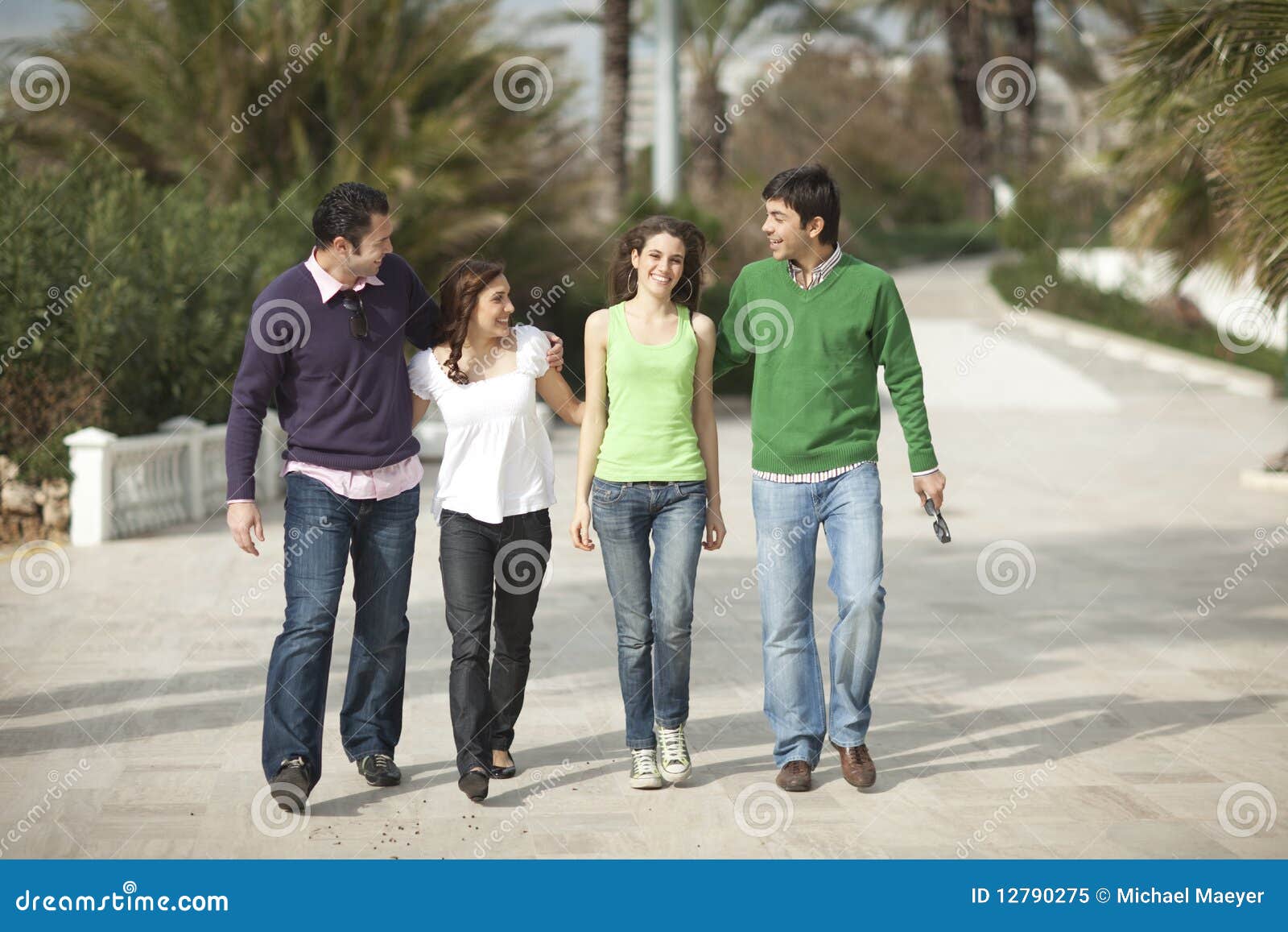 Four Happy People Walking Royalty-Free Stock Photo | CartoonDealer.com ...