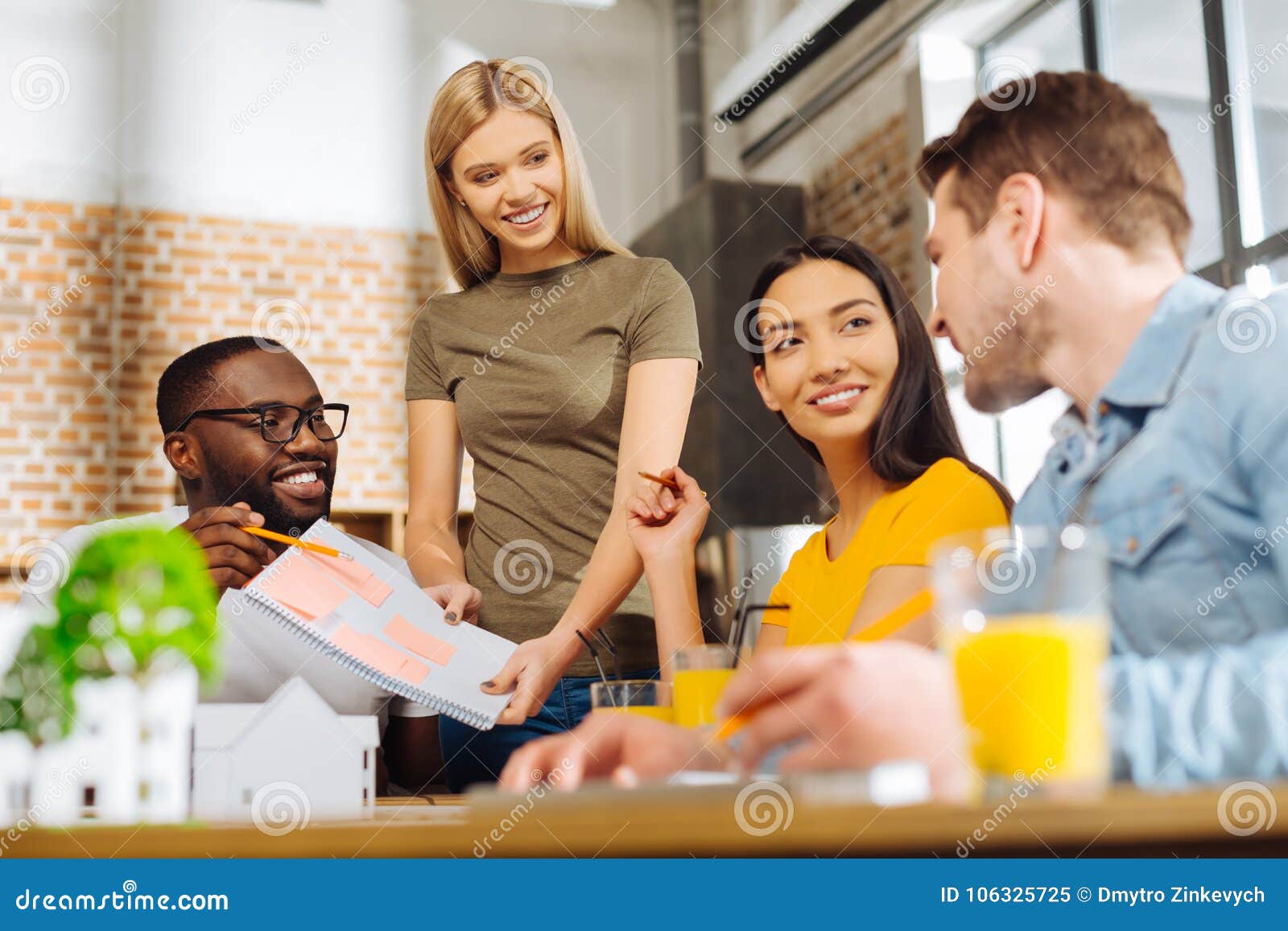 Four Happy Promising Students Composing Presentation Stock Image ...
