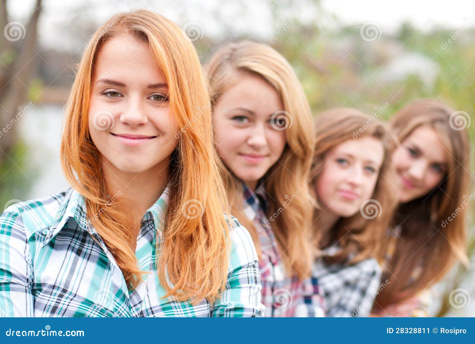 Four Happy Teenage Friends Outdoors Stock Image - Image of middle, lady ...