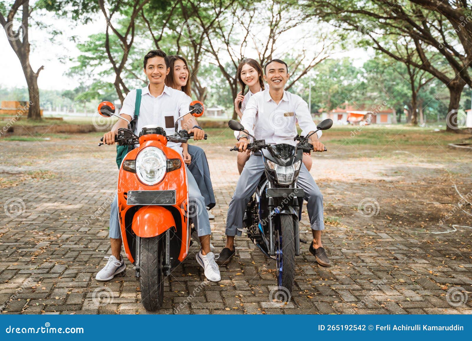 Four High School Students in Uniform Will Leave by Motorbike Stock ...